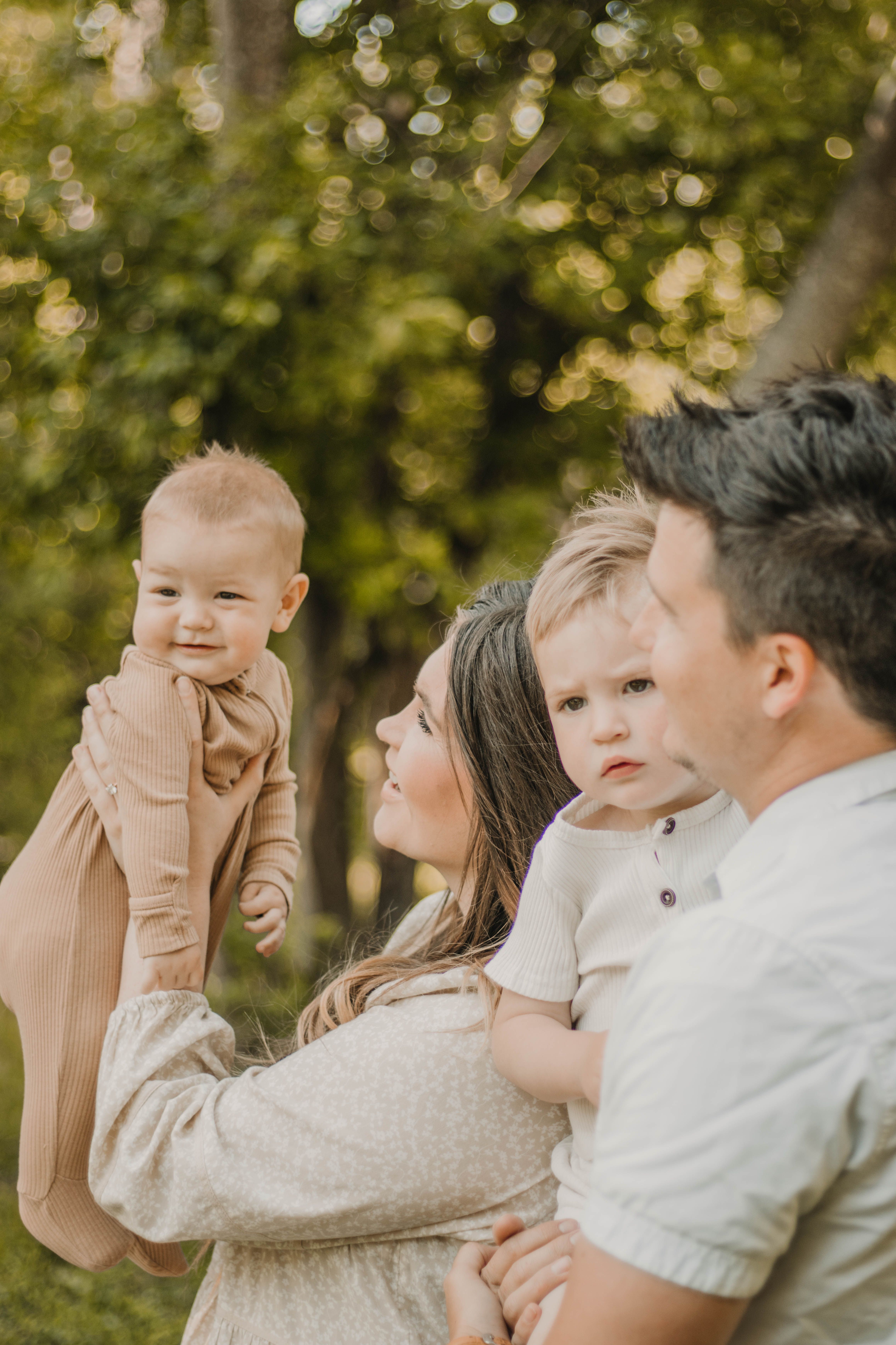 Warm Family Portrait in Kansas City Park · Free Stock Photo