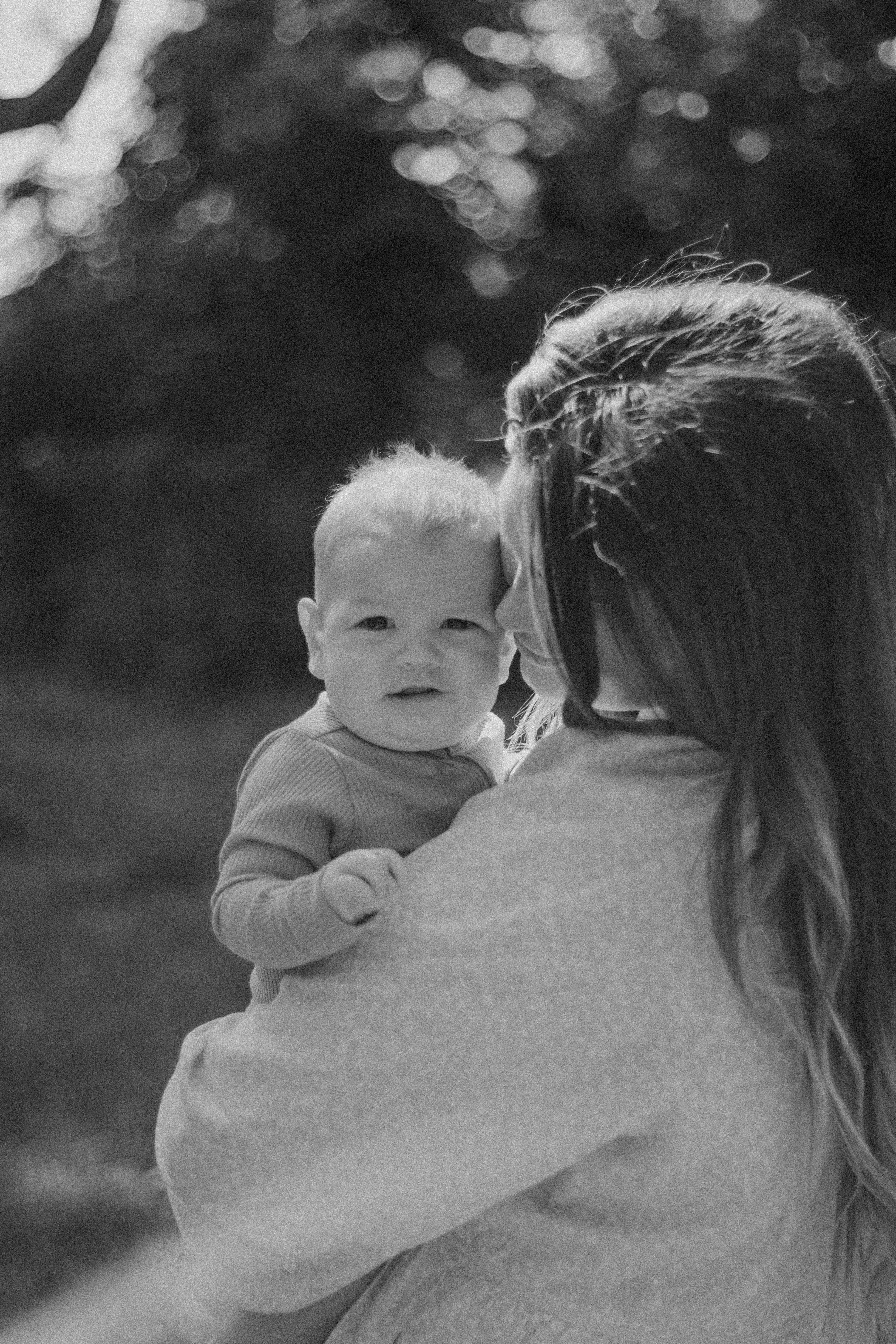 Heartwarming Outdoor Family Bonding Moment · Free Stock Photo