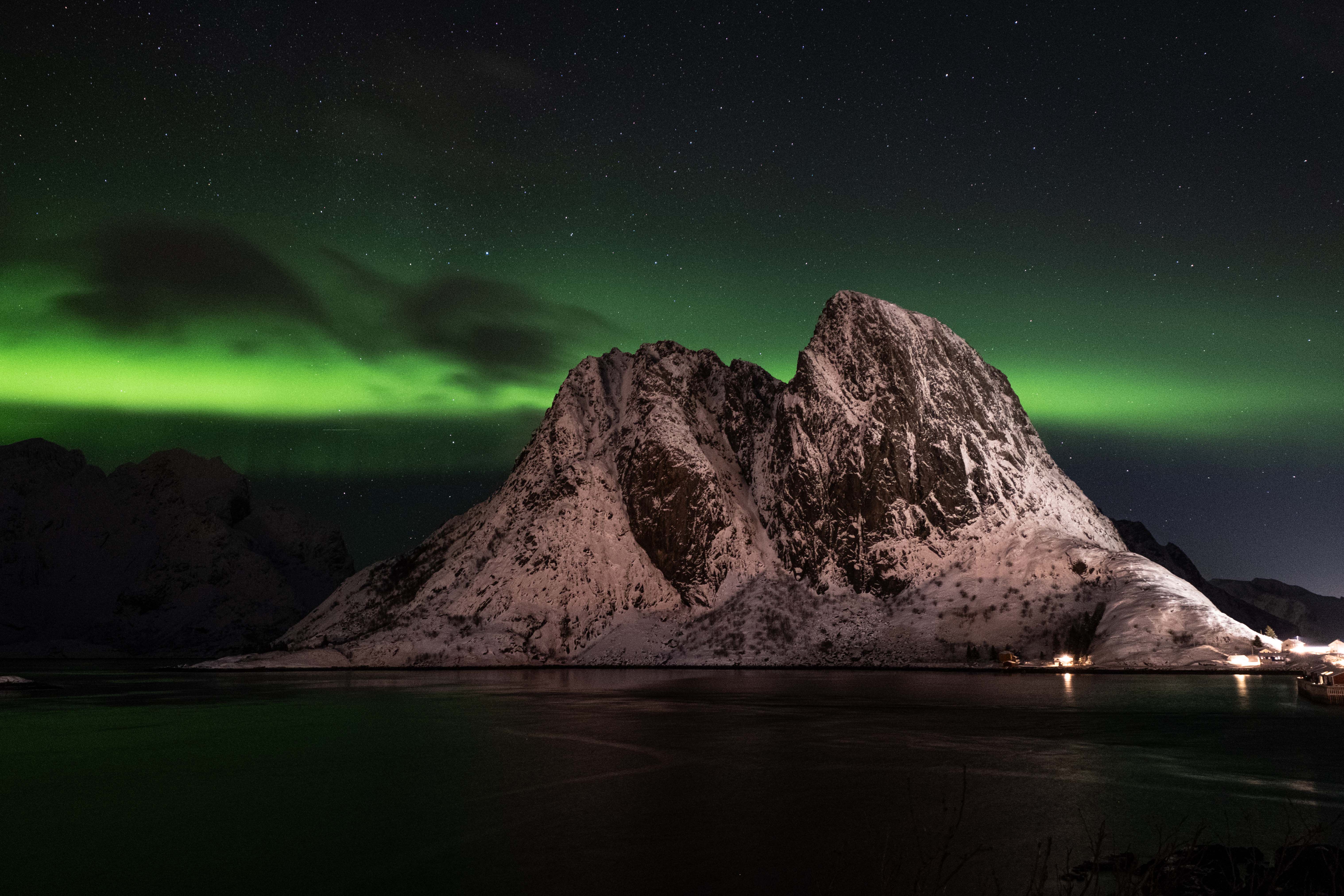 Northern Lights Over Snowy Mountain Landscape · Free Stock Photo