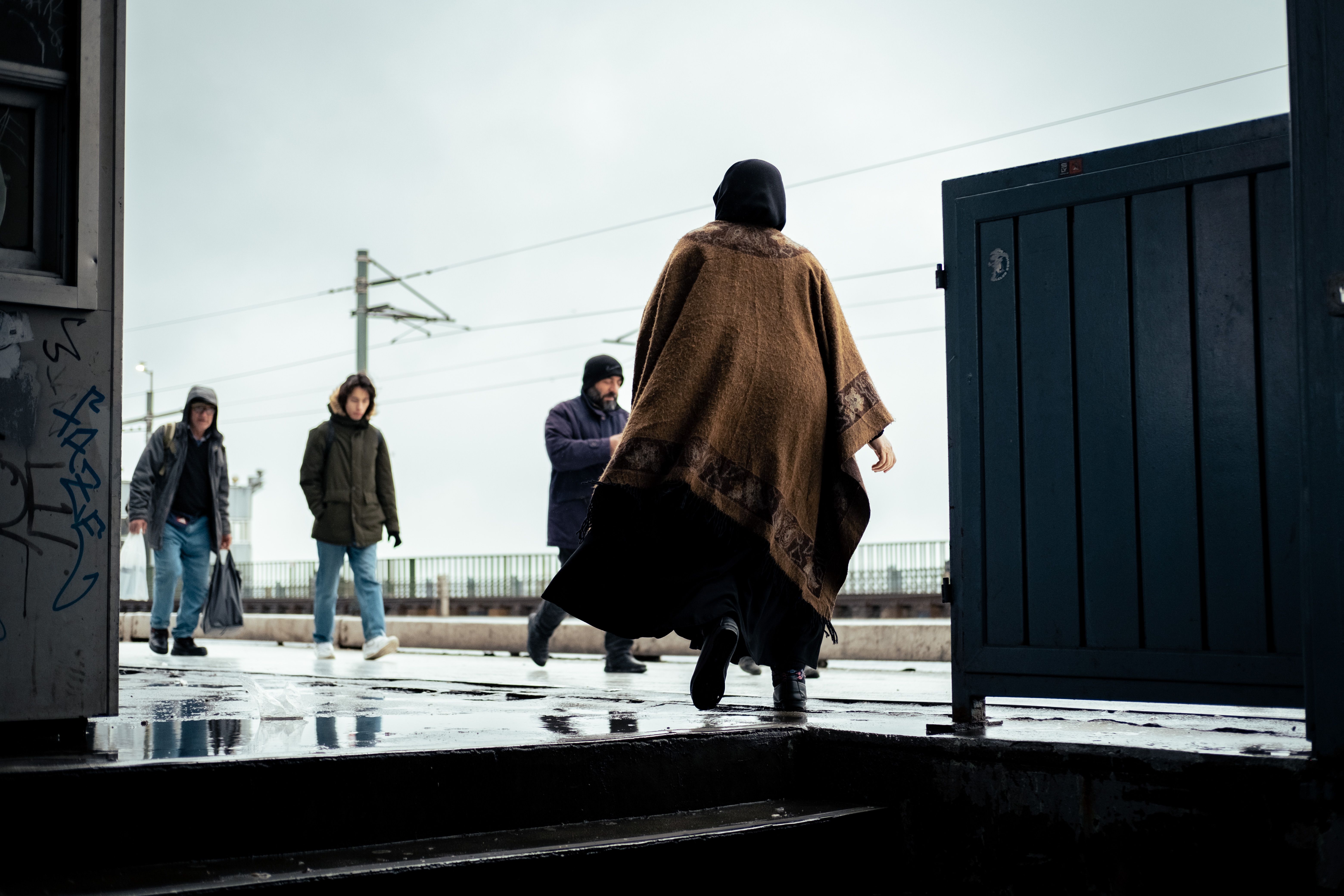 Urban Street Scene on Rainy Day with People · Free Stock Photo