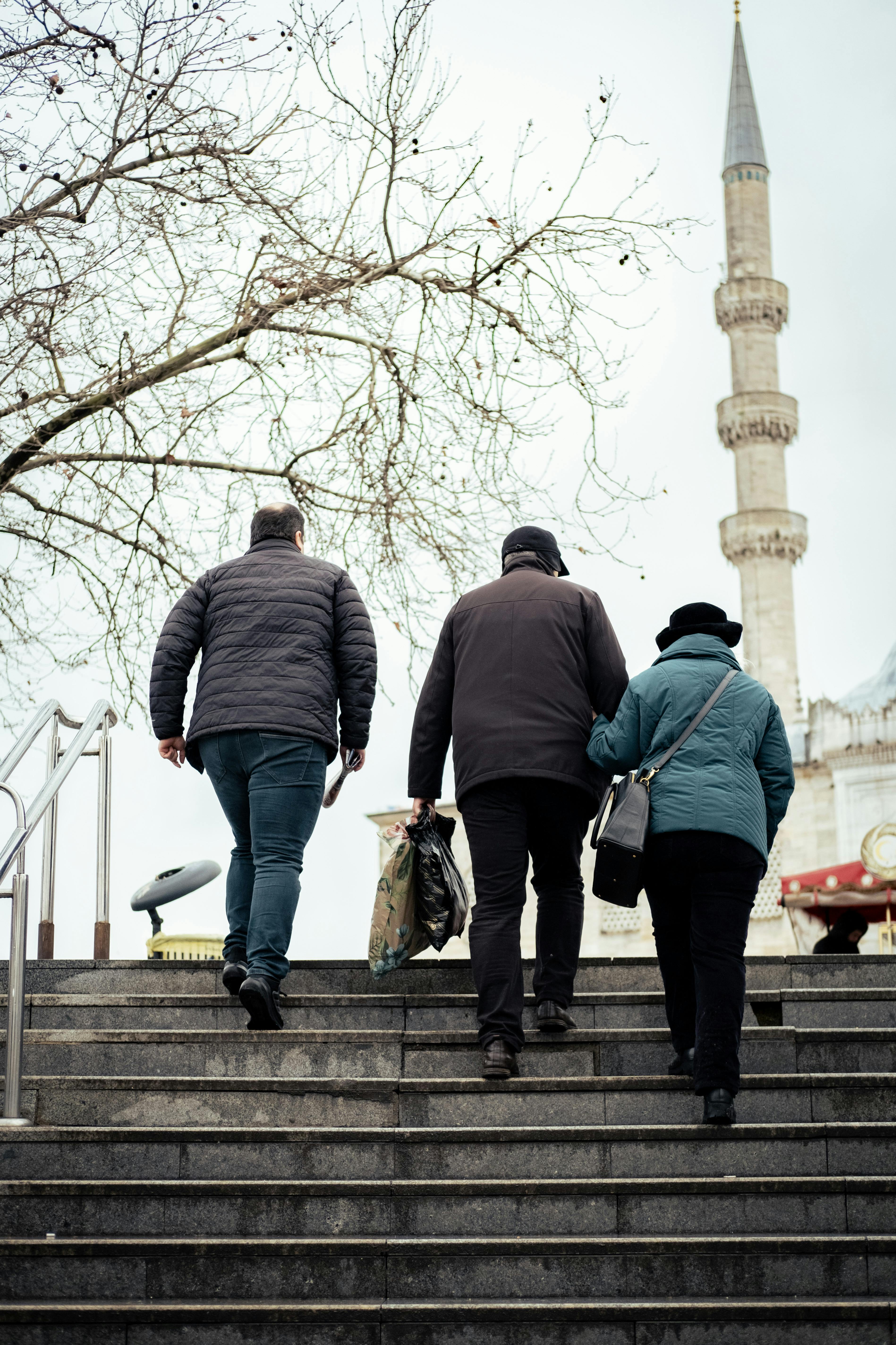 People Climbing Steps Near Mosque in Istanbul · Free Stock Photo