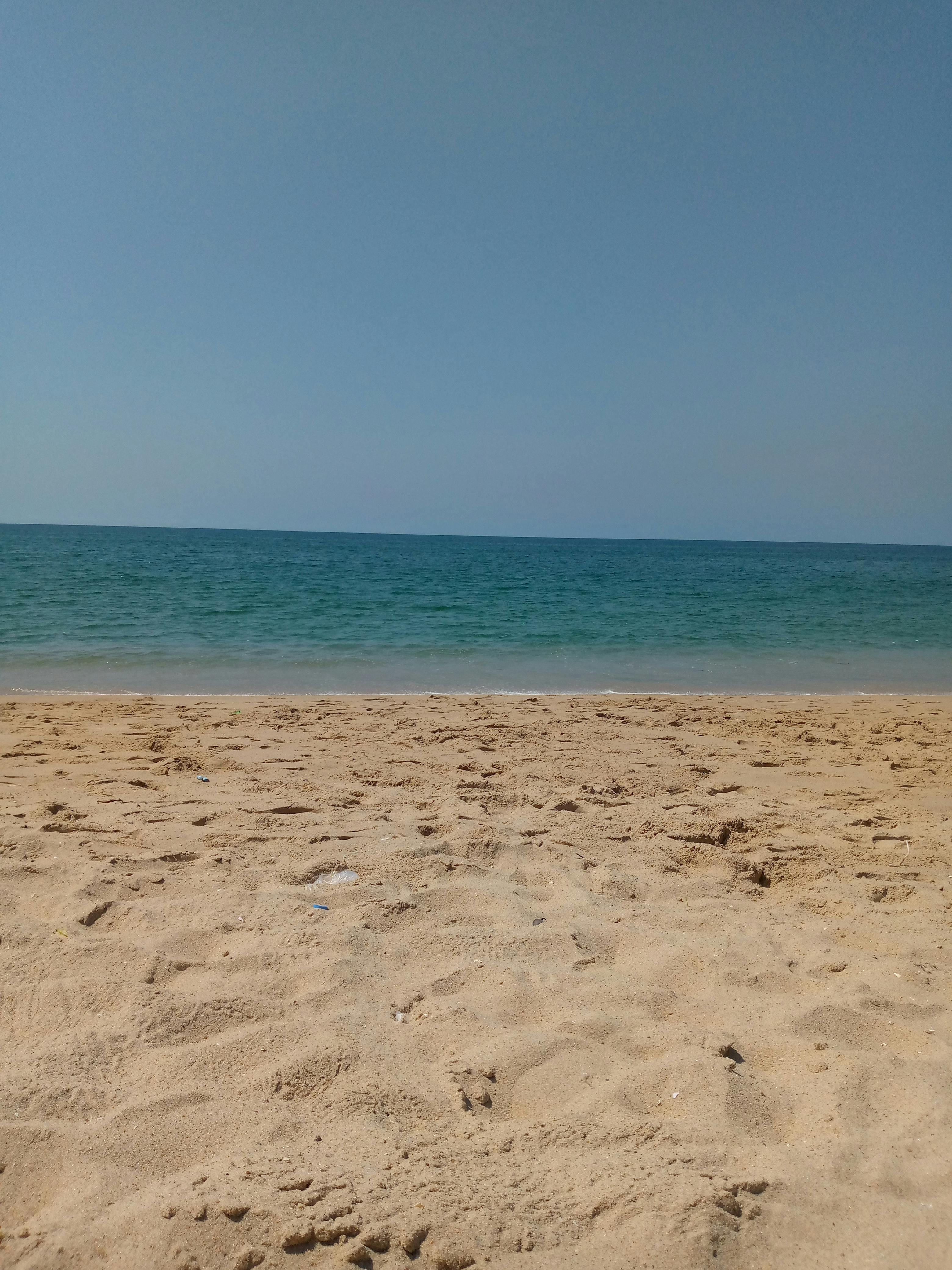 Peaceful Sandy Beach in Luanda, Angola · Free Stock Photo