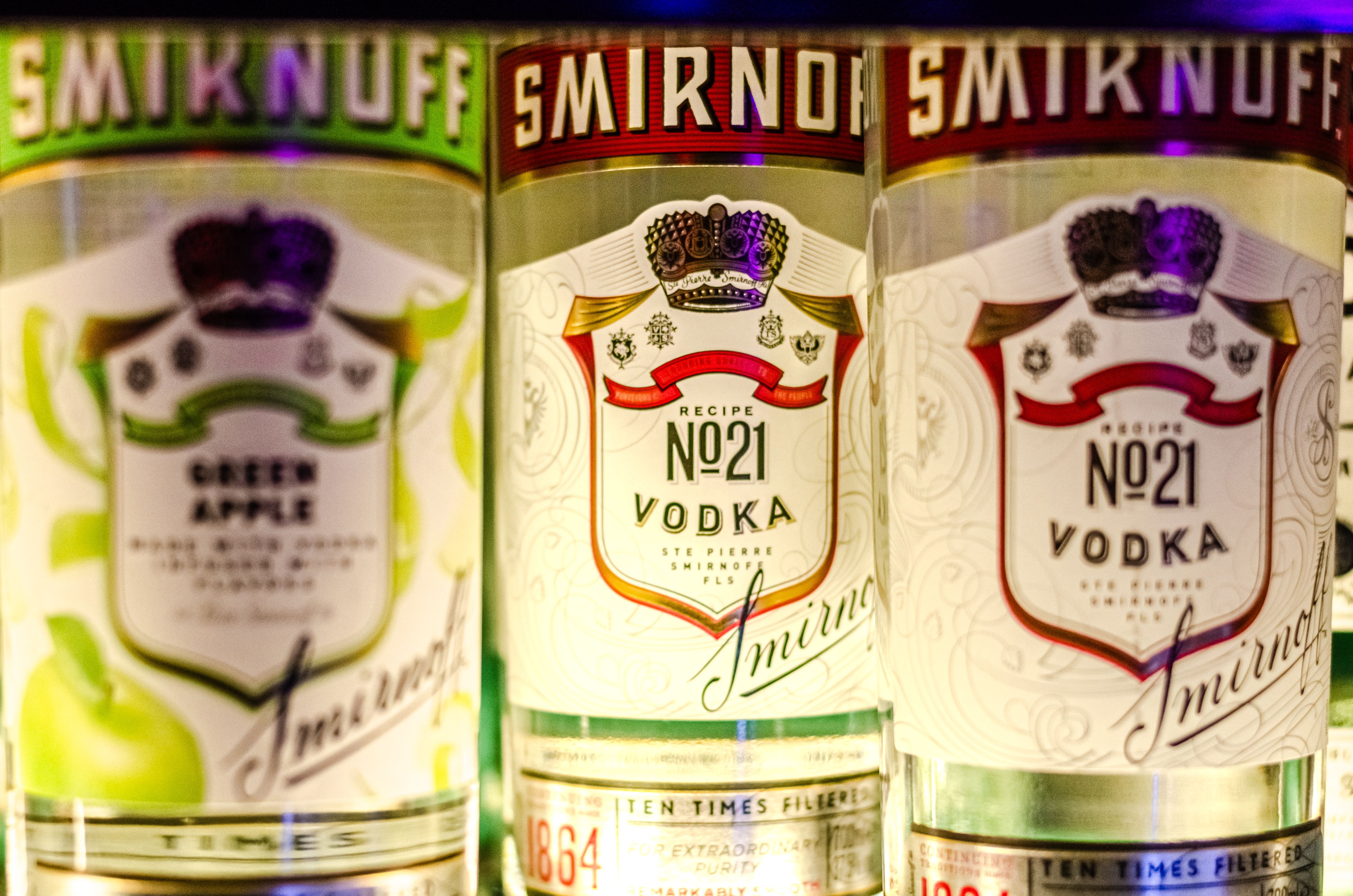 Smirnoff Vodka Bottles Display Close-Up · Free Stock Photo