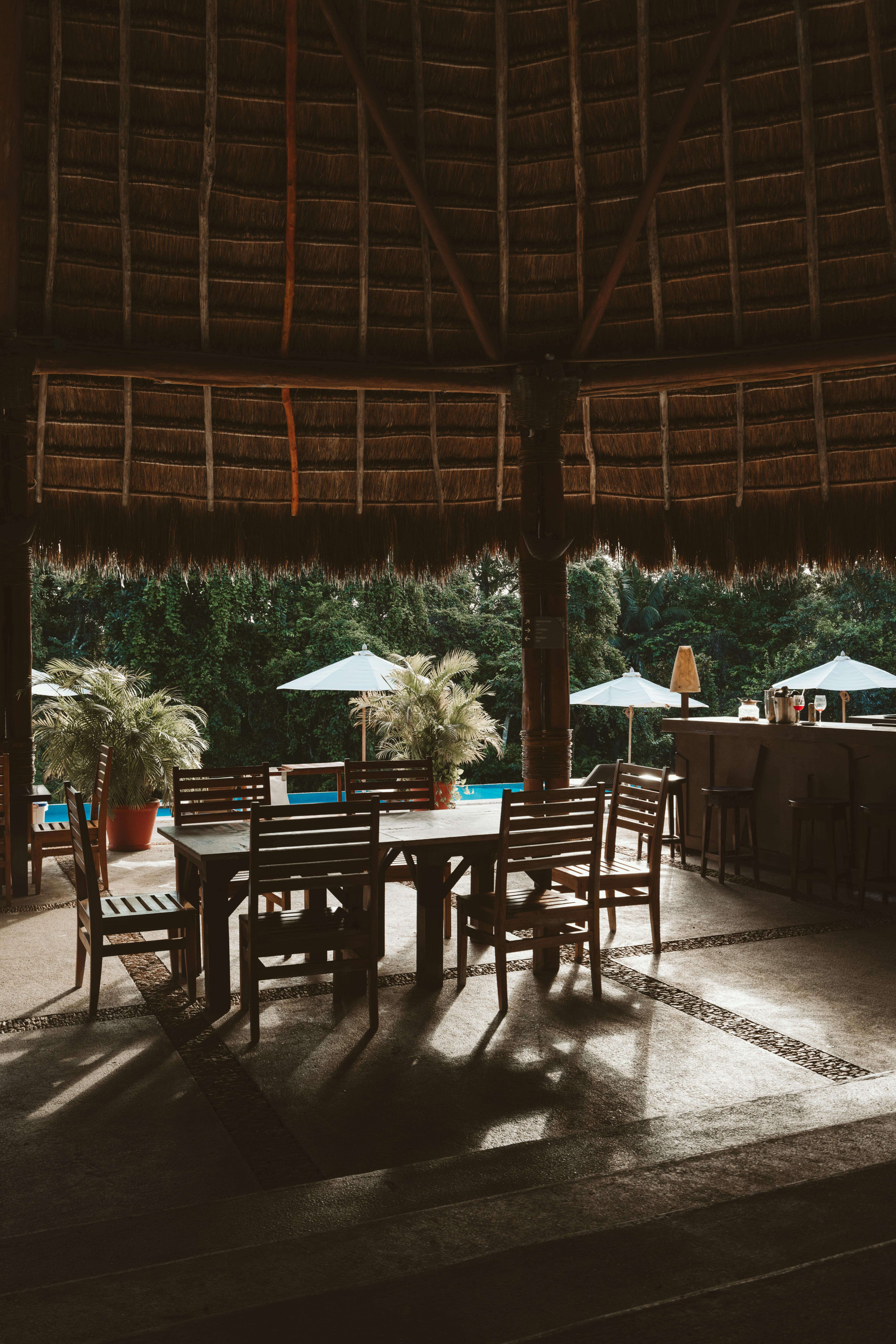 Rustic Outdoor Restaurant with Wooden Furniture · Free Stock Photo