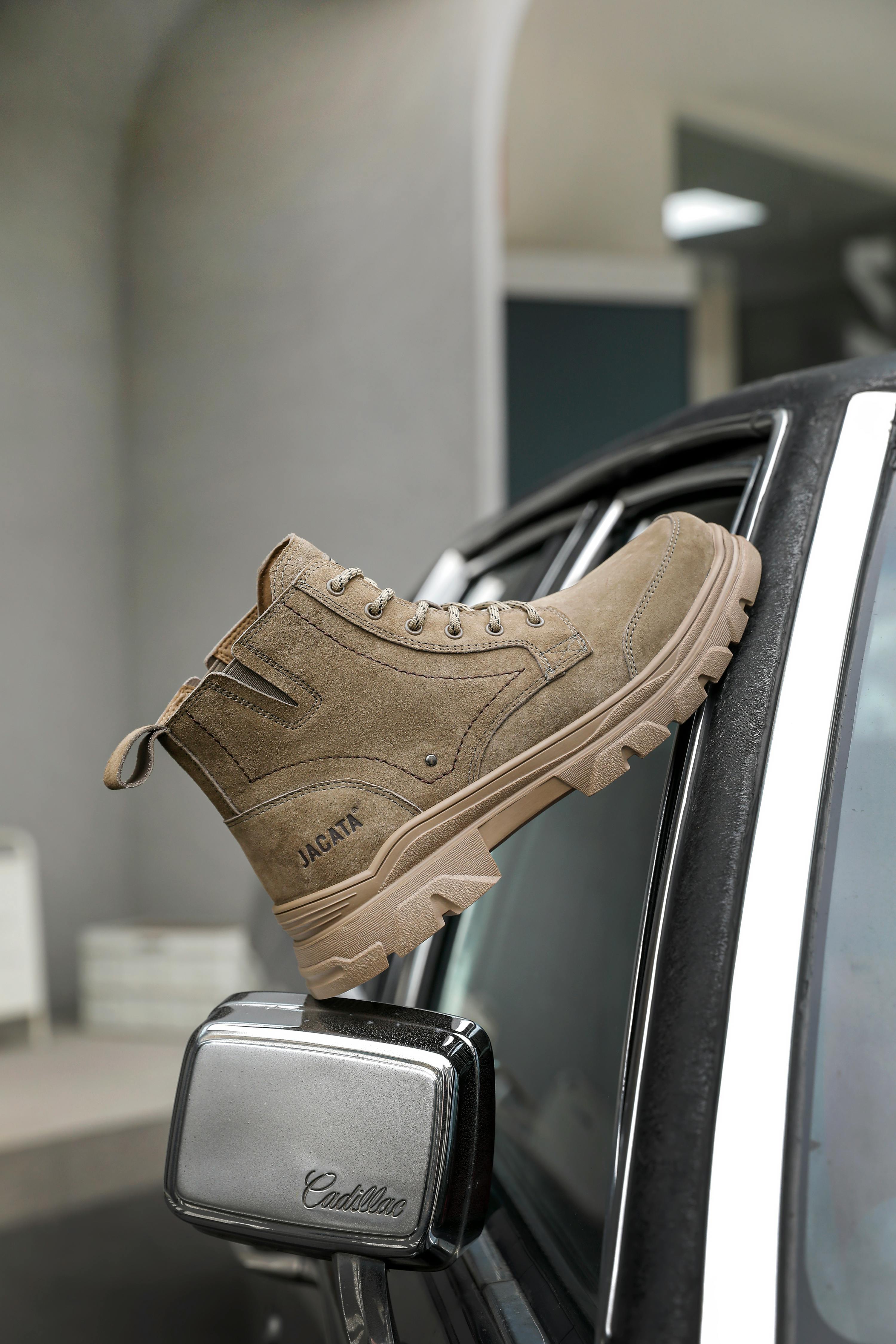 Brown Leather Boot on Retro Car Mirror · Free Stock Photo