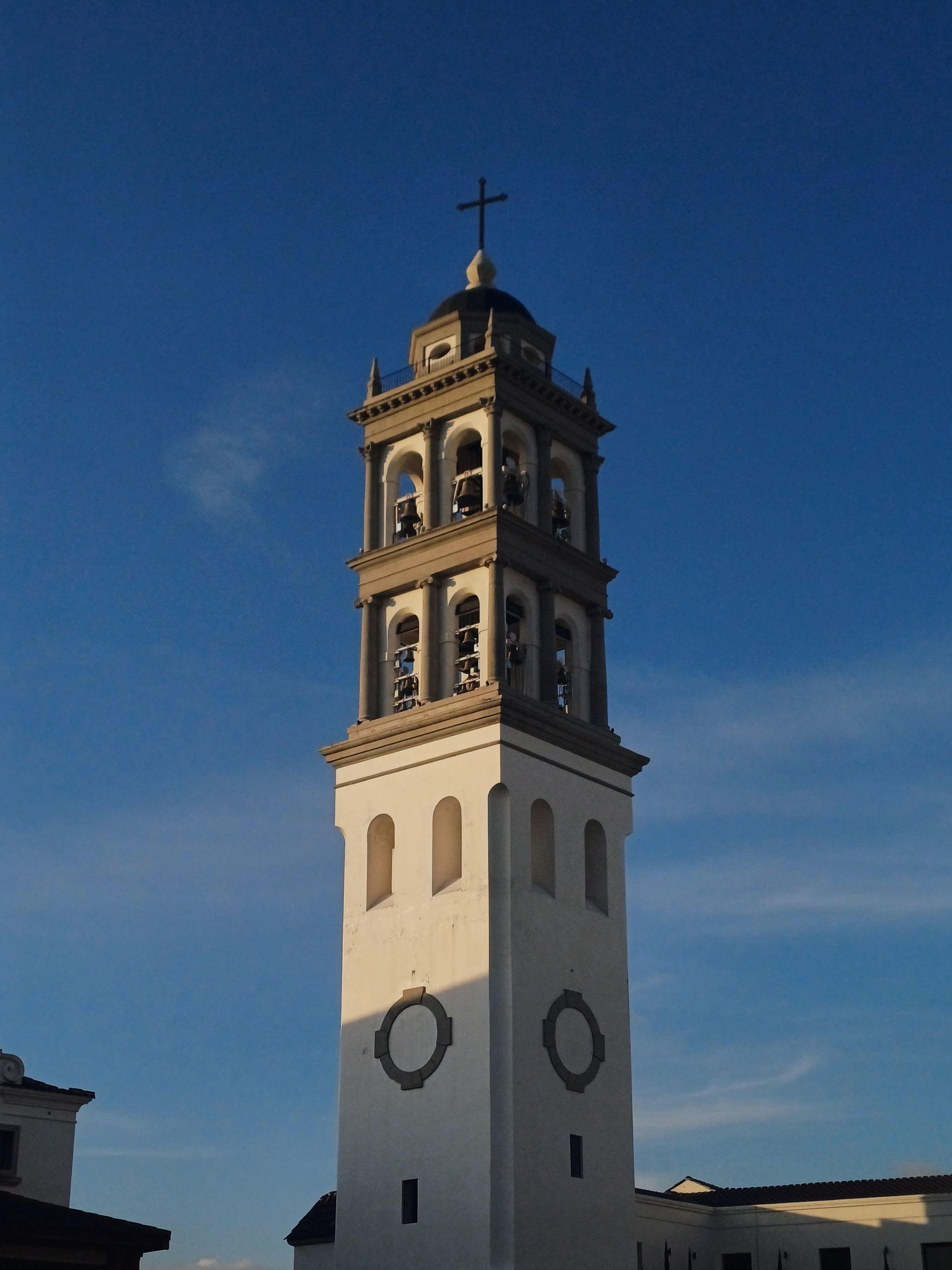 Majestic Bell Tower Under Clear Blue Sky · Free Stock Photo