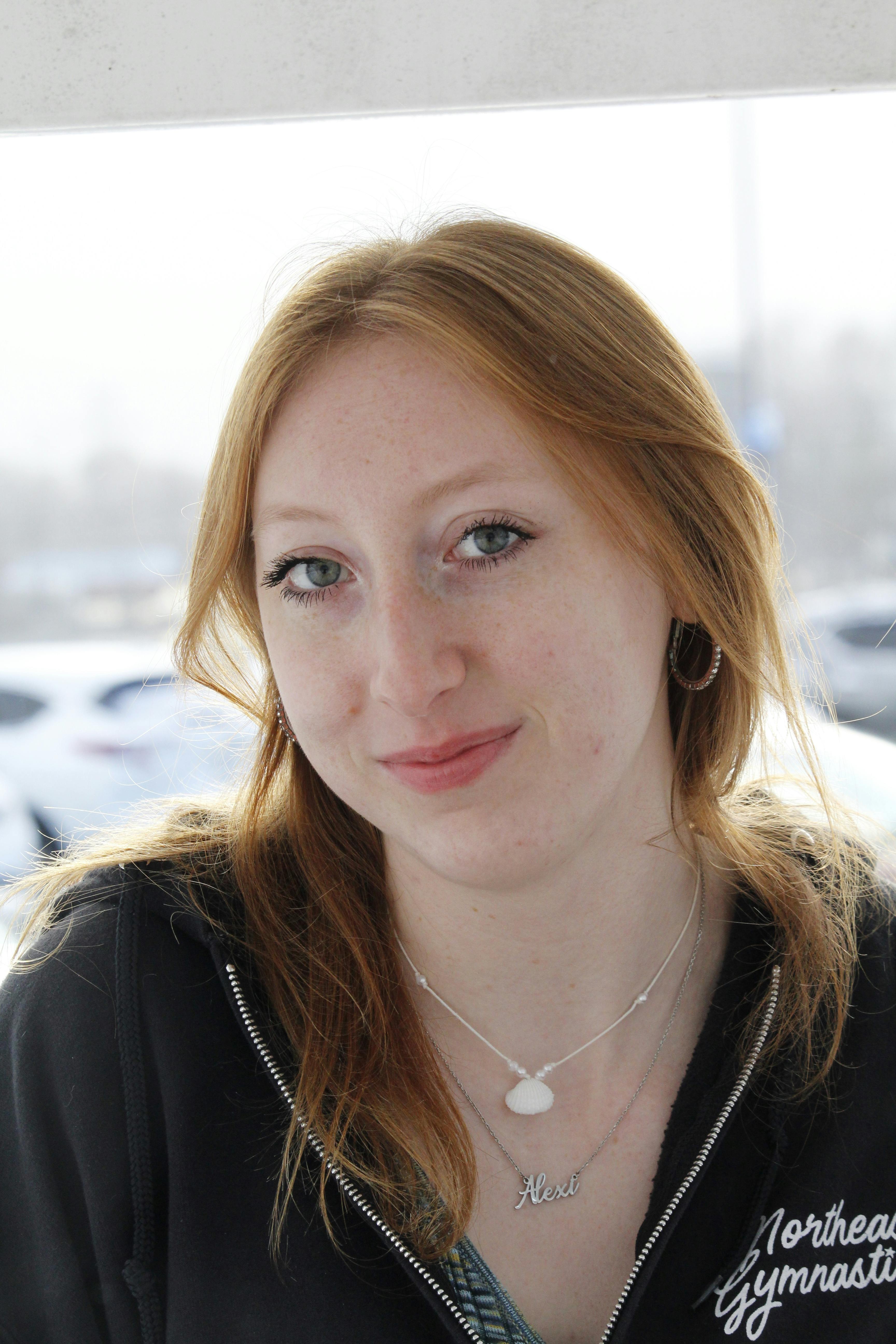 Charming Outdoor Portrait of a Young Woman · Free Stock Photo