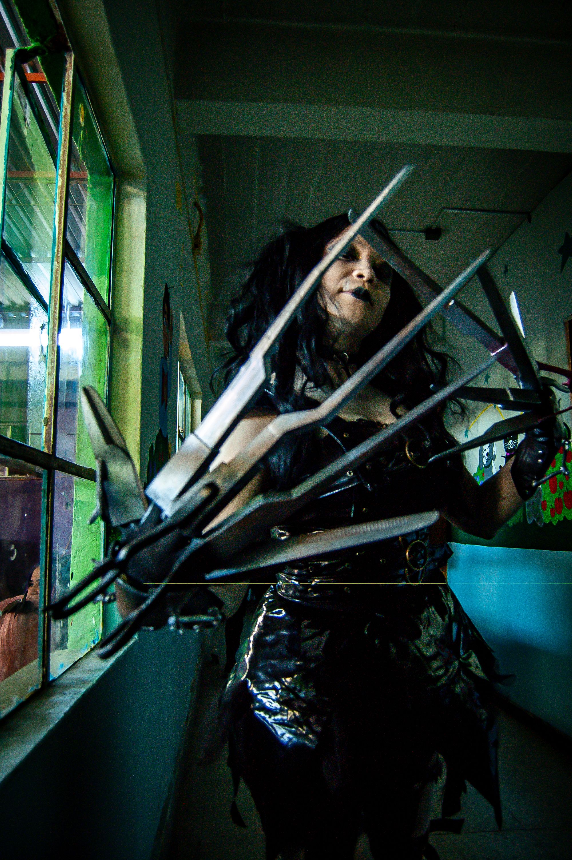 Cosplayer in Gothic Costume with Blade Hands · Free Stock Photo