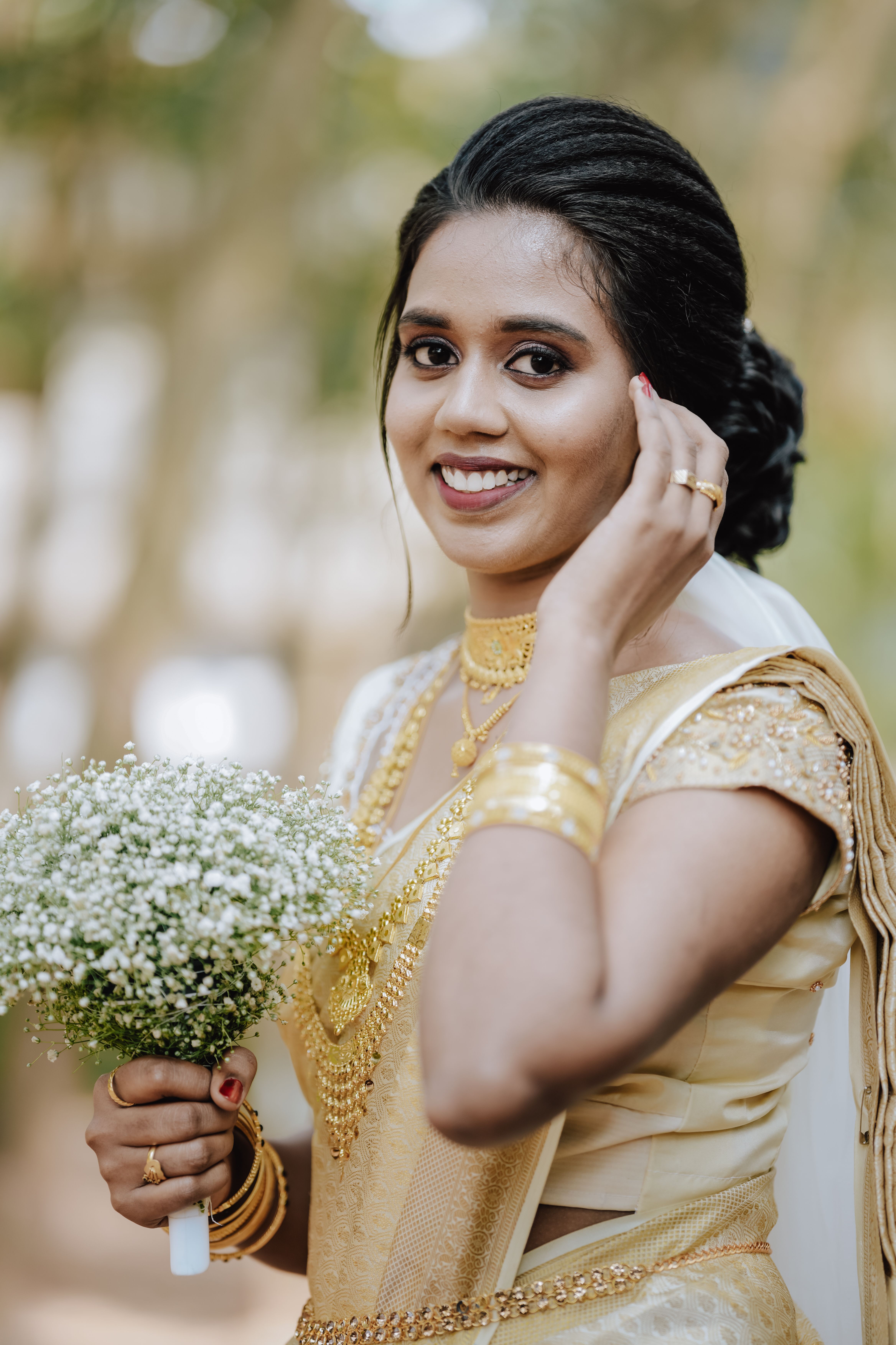 Beautiful Indian Bride Holding Bouquet in Traditional Attire · Free ...