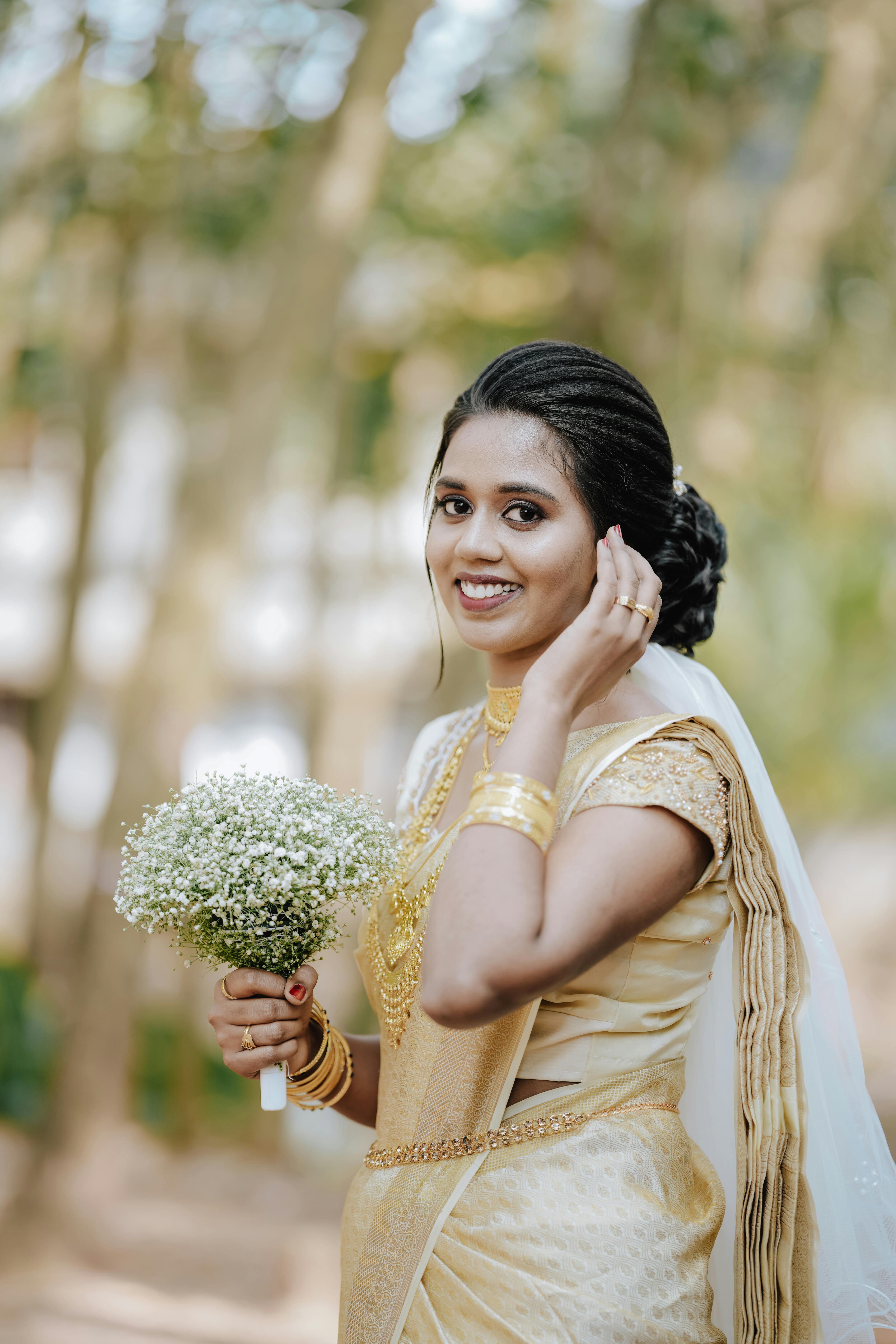 Beautiful South Asian Bride in Traditional Sari Outdoors · Free Stock Photo