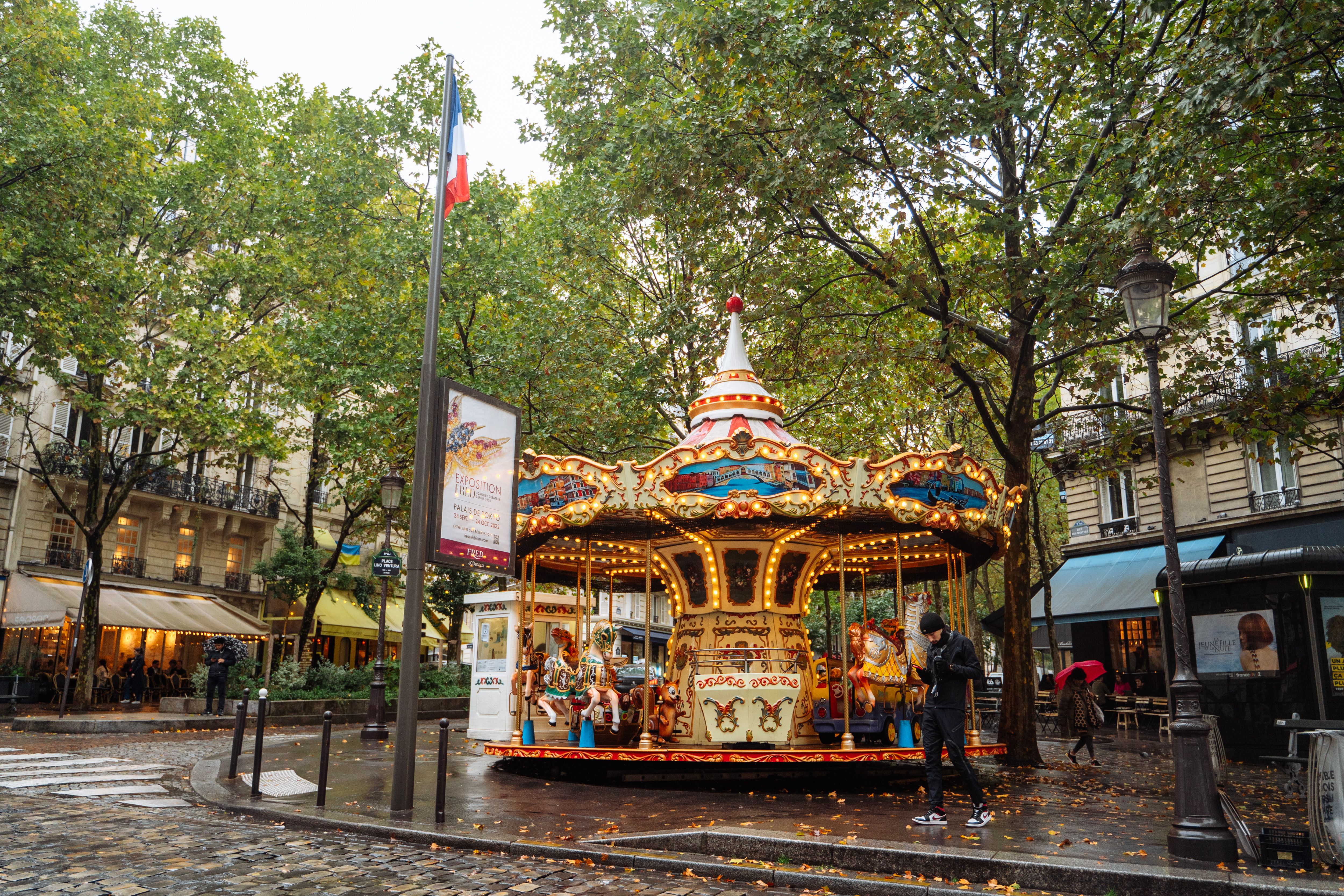 Charming Paris Carousel in Autumn Rain · Free Stock Photo