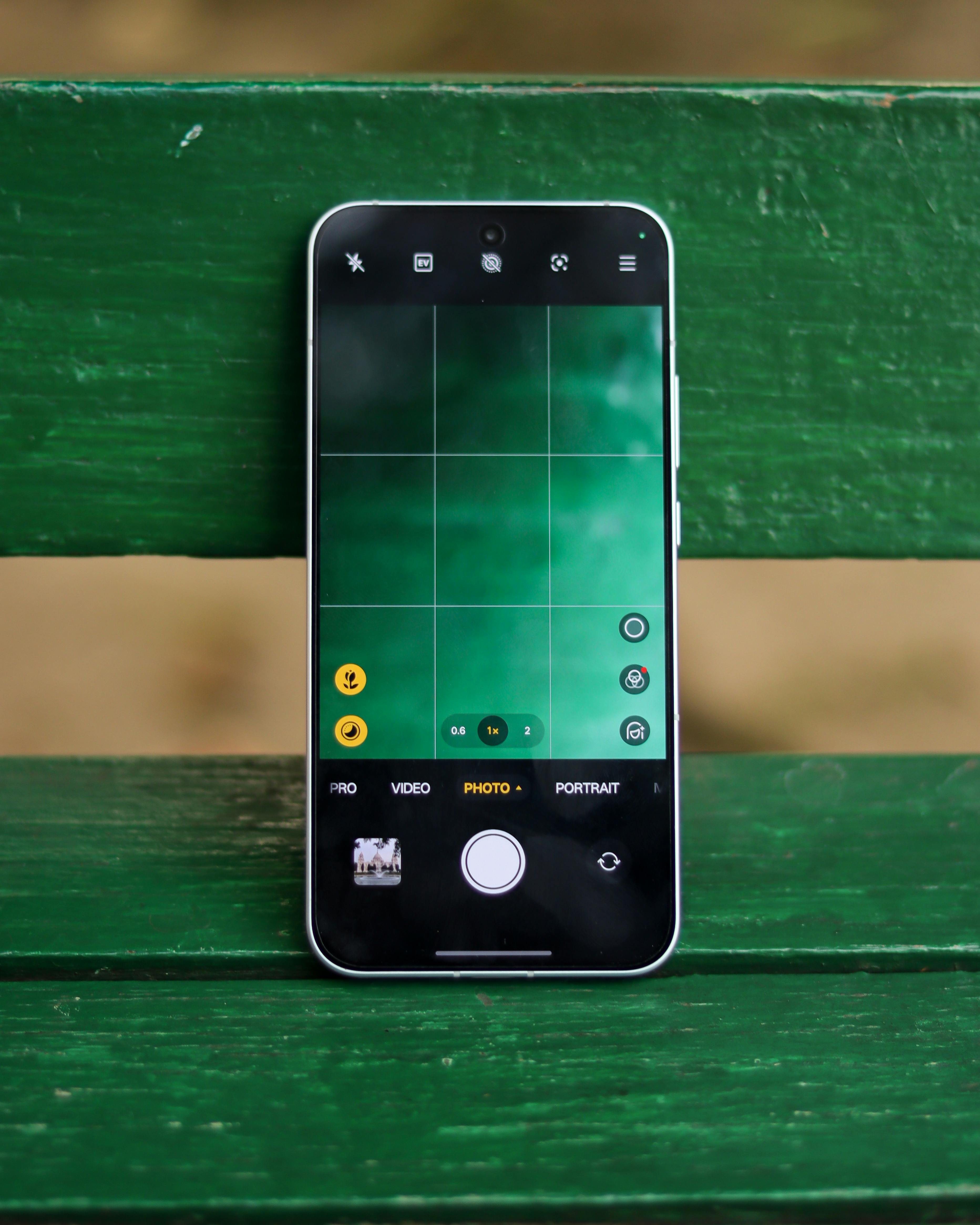 Smartphone Camera Interface on Green Bench · Free Stock Photo