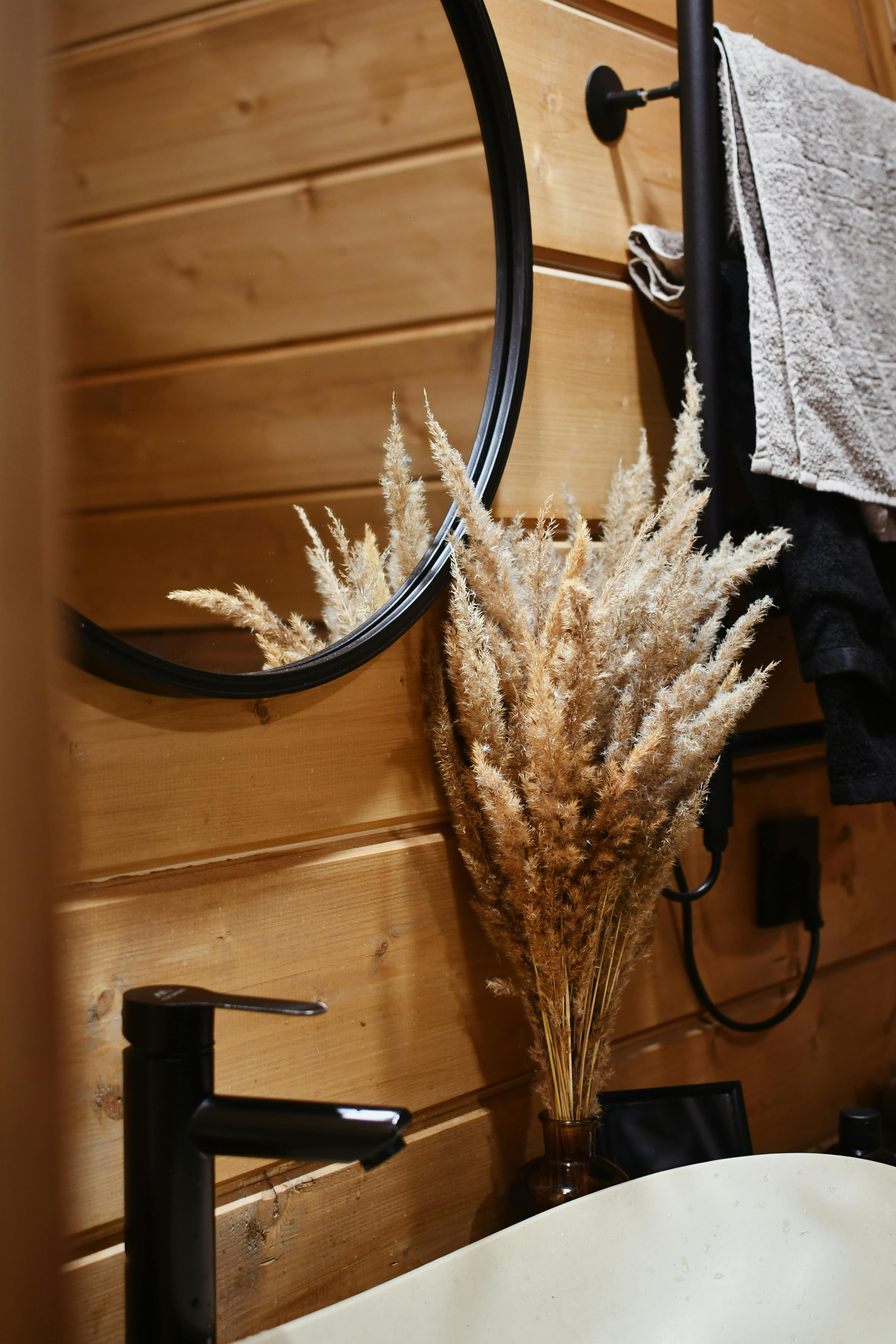 Cozy Bathroom with Rustic Wooden Walls and Mirror · Free Stock Photo