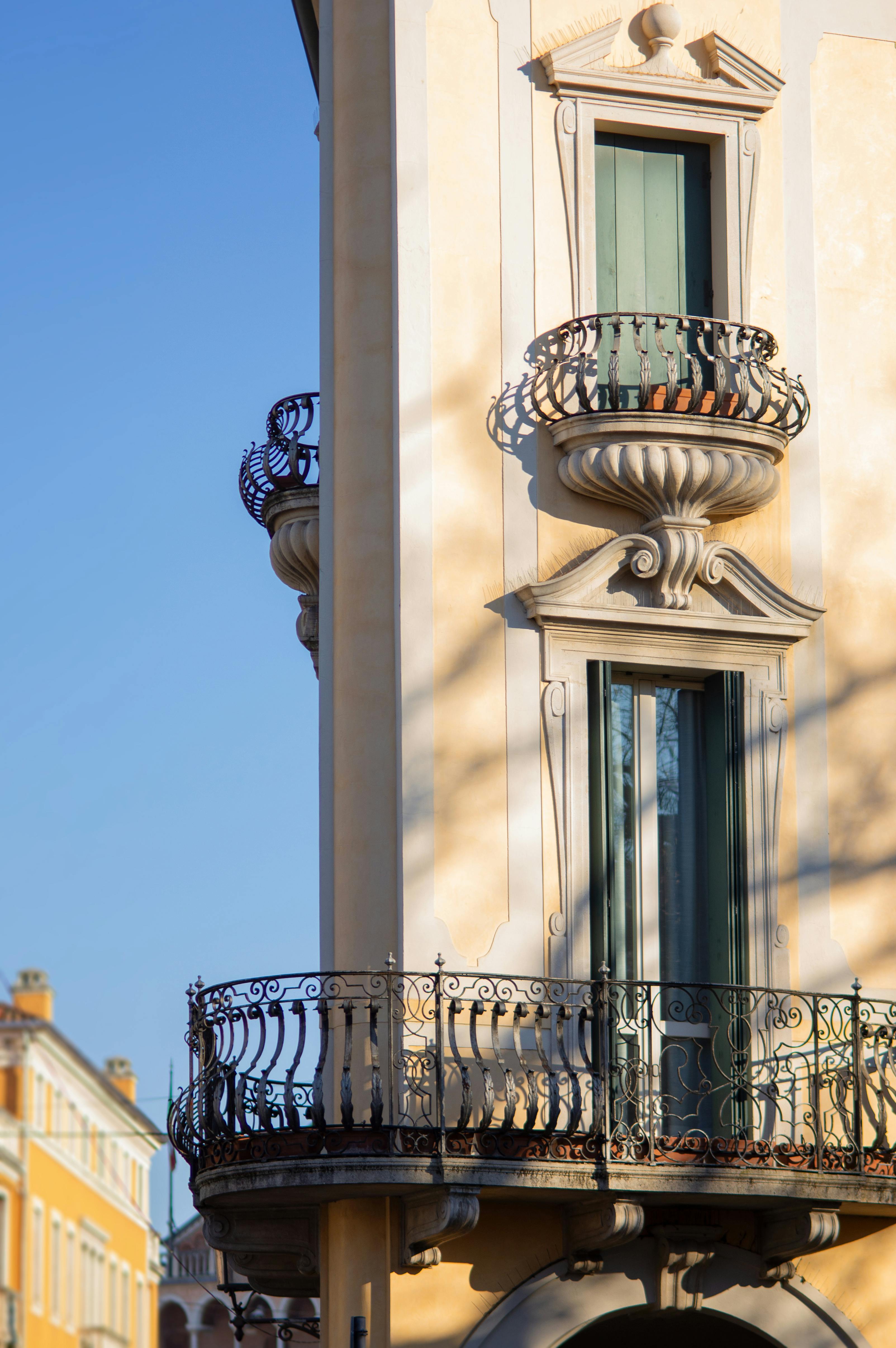 Elegant European Architecture with Ornate Balconies · Free Stock Photo