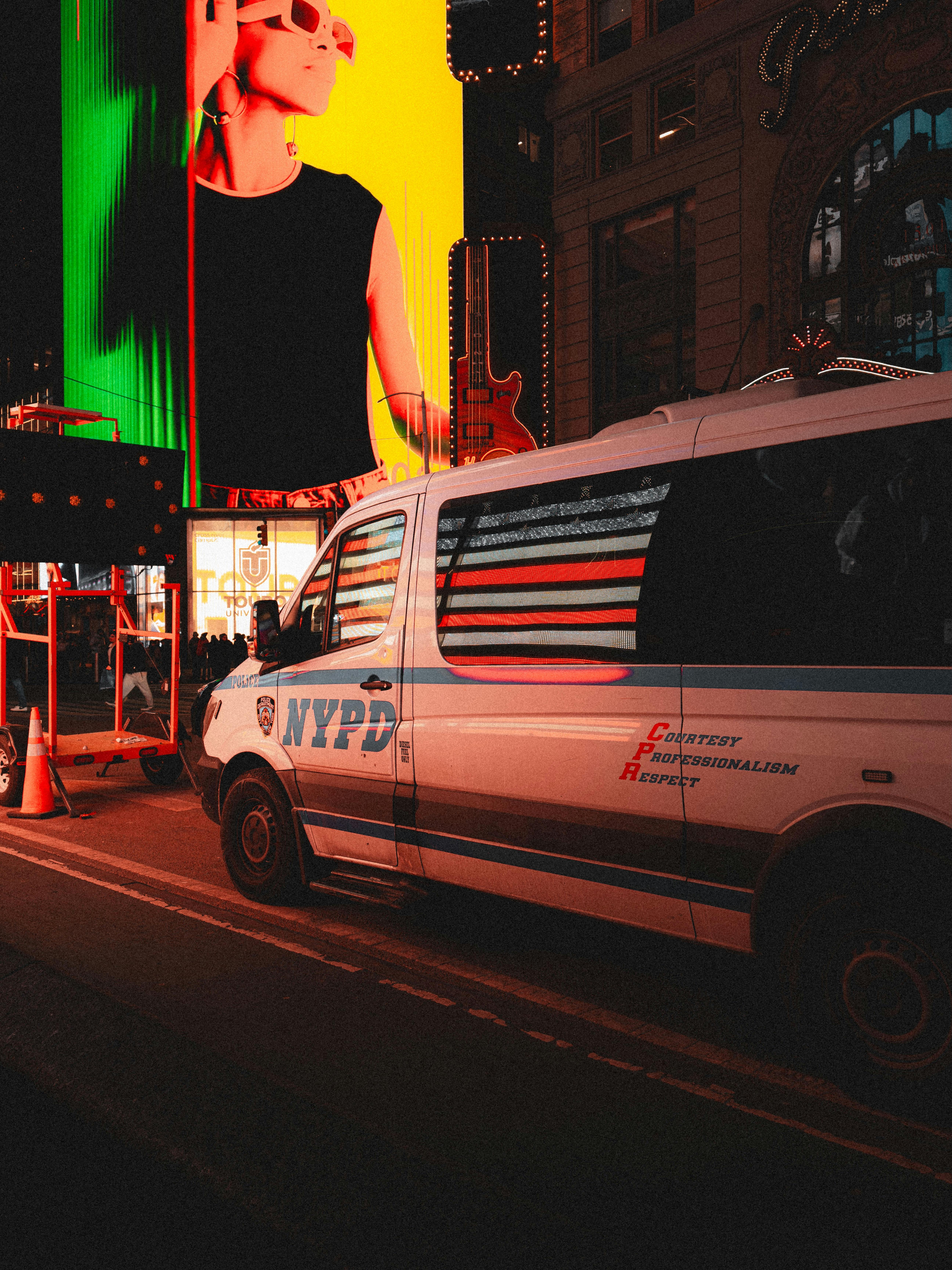 NYPD Van in Times Square at Night · Free Stock Photo