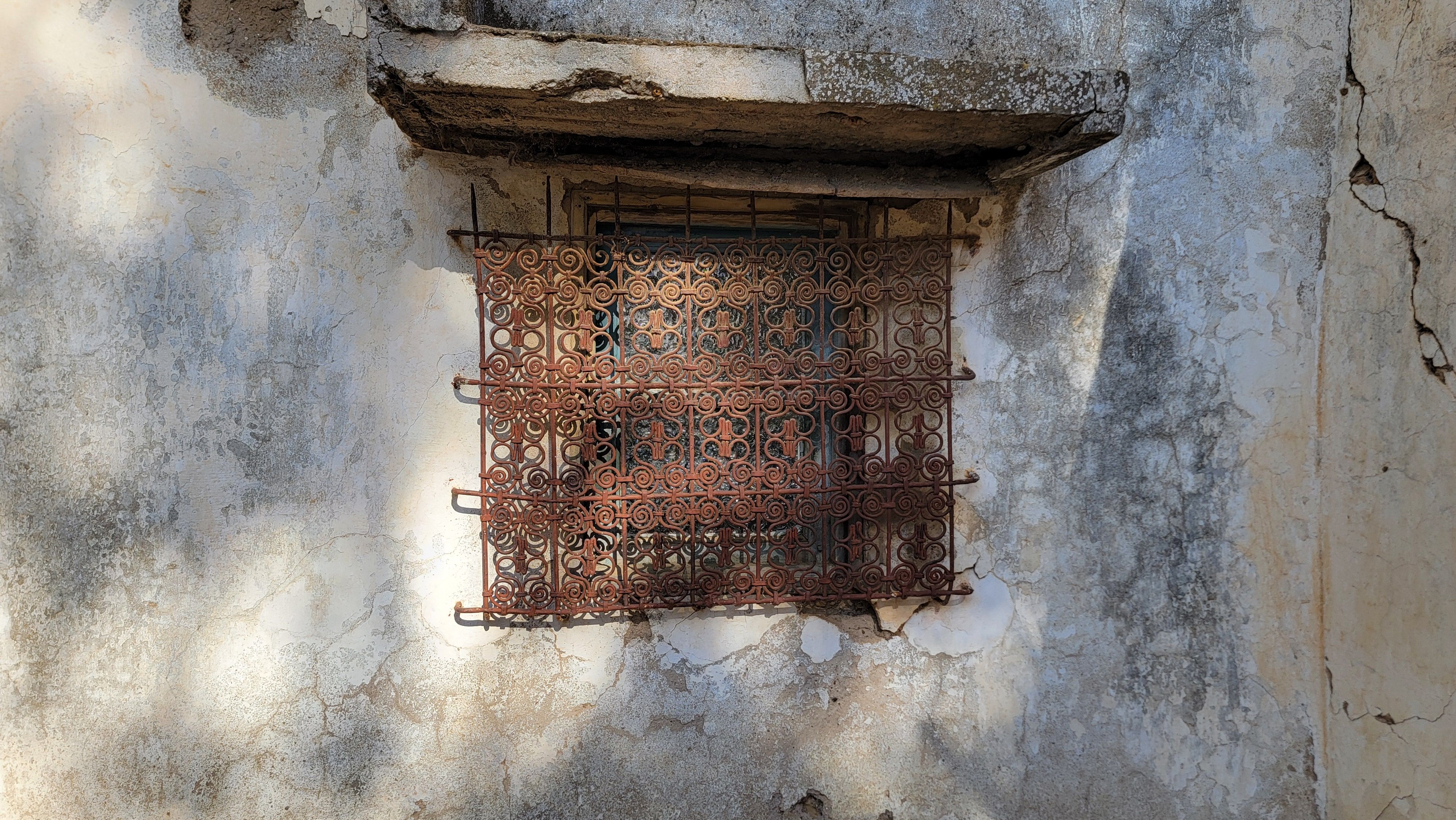 Rustic Ironwork Grate on Abandoned Building · Free Stock Photo