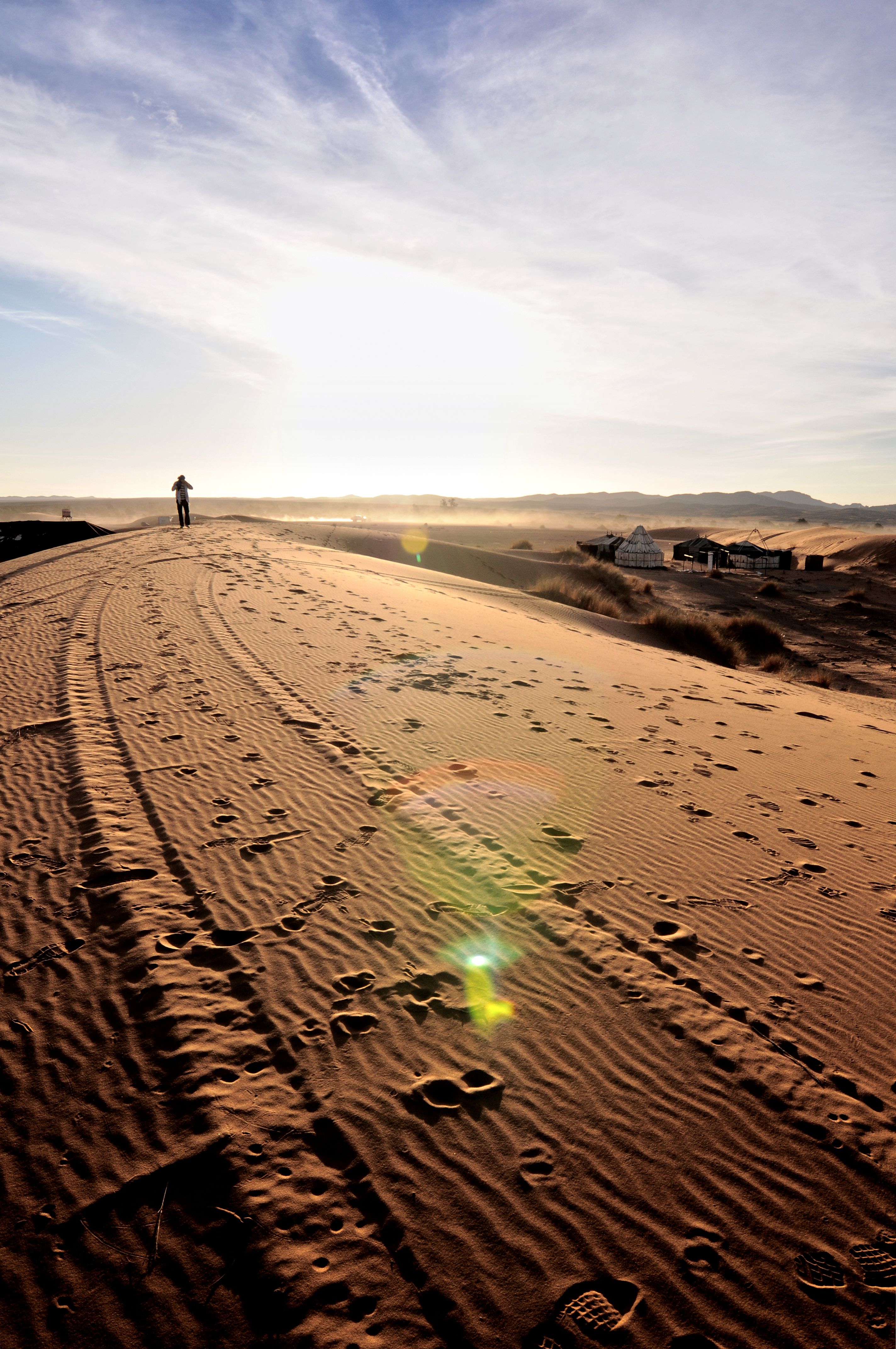 Person Walking on Sand Dunes in Merzouga Desert · Free Stock Photo