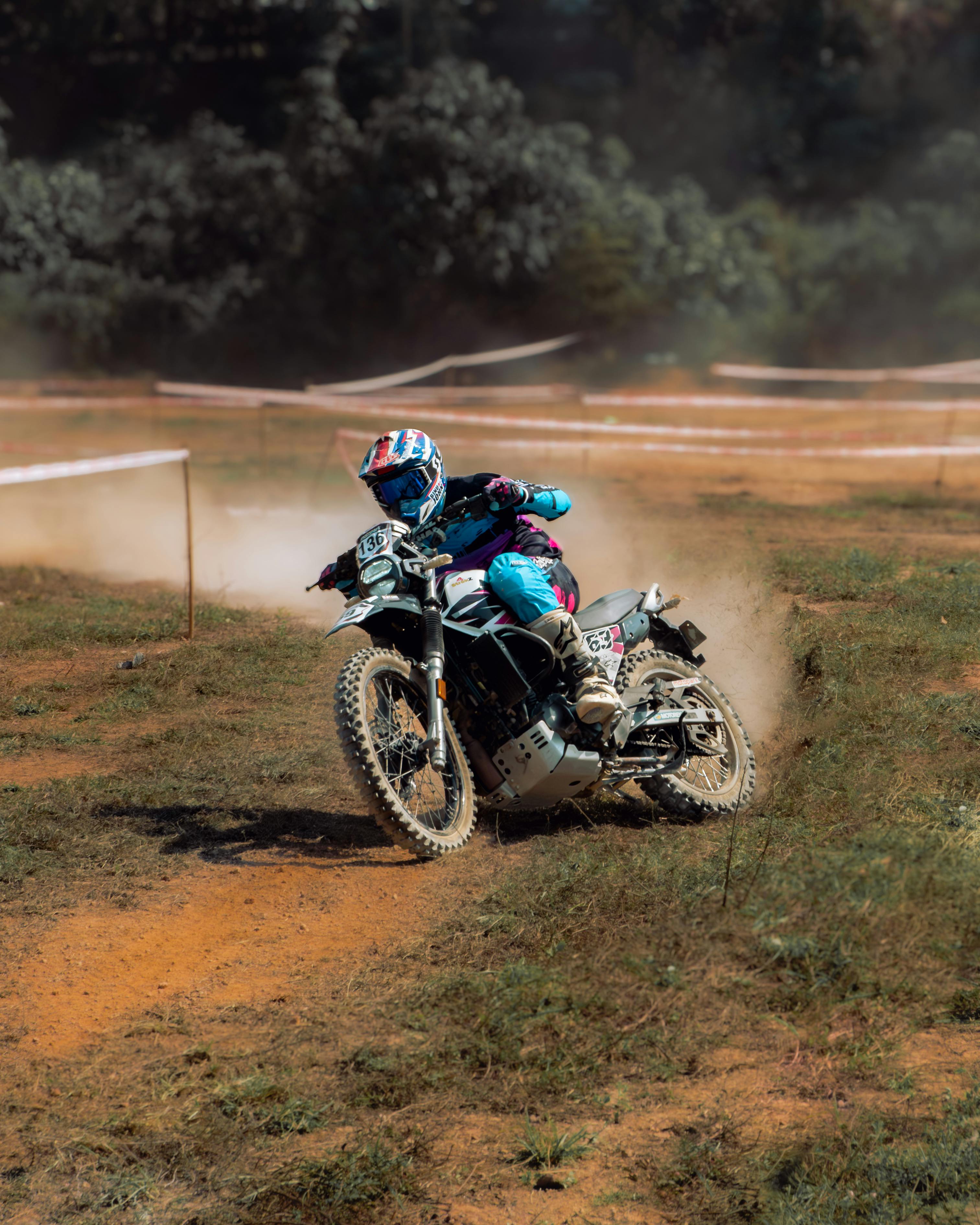Dynamic Off-Road Motorcycle Race Scene · Free Stock Photo