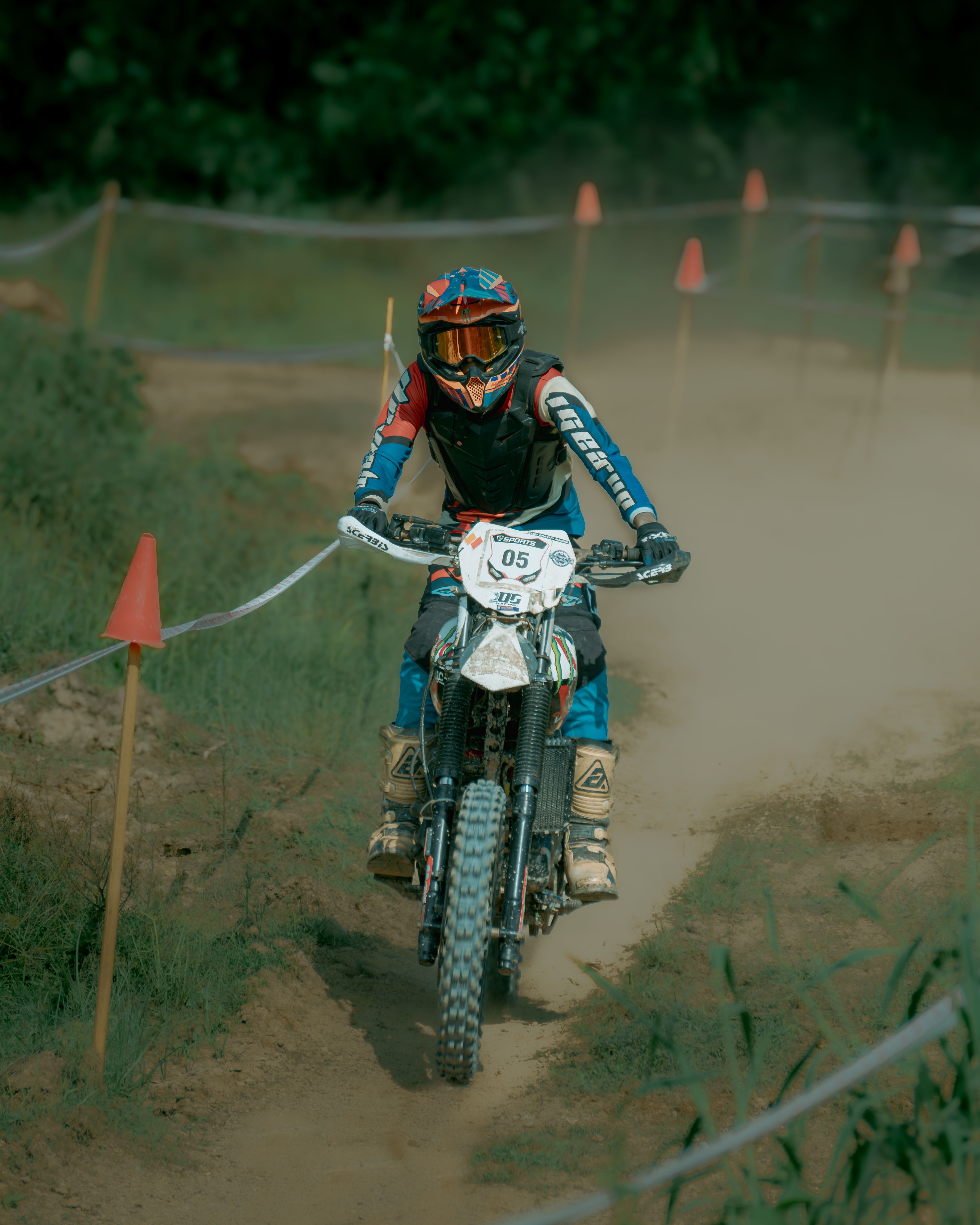 Exciting Off-Road Motorcycle Race in Action · Free Stock Photo