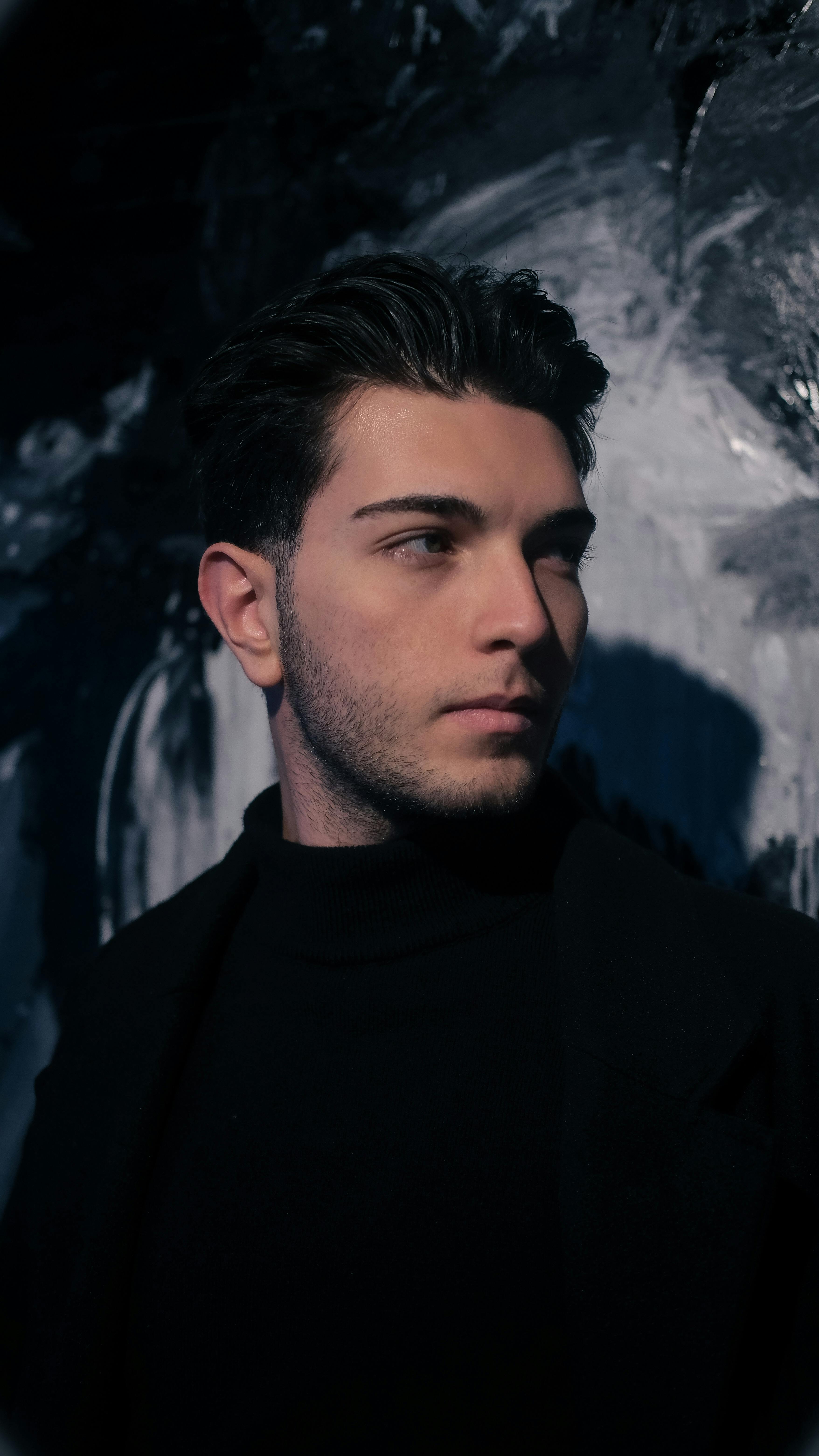 Dramatic Portrait of Young Man in Shadow · Free Stock Photo