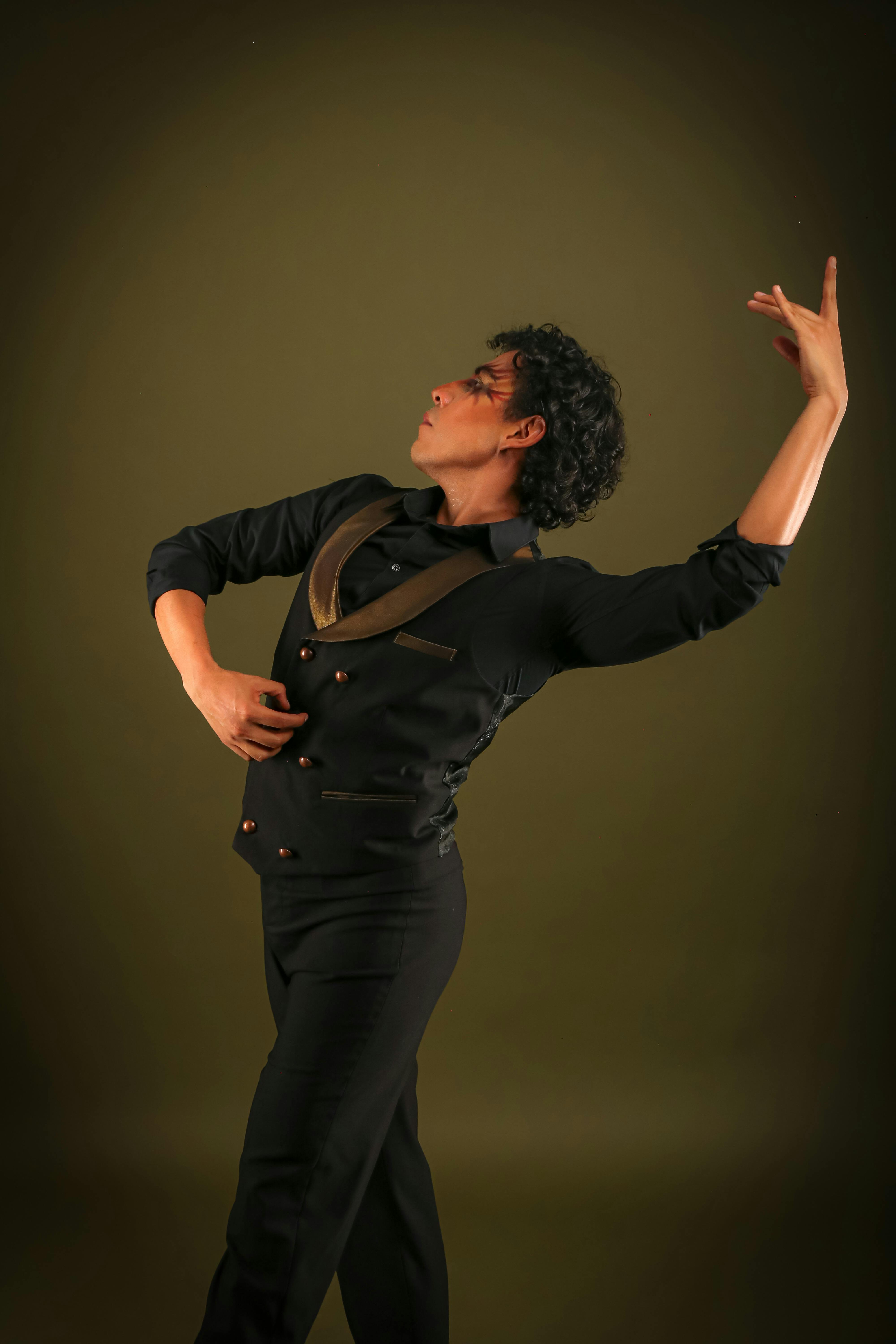 Graceful Male Dancer in Artistic Pose · Free Stock Photo