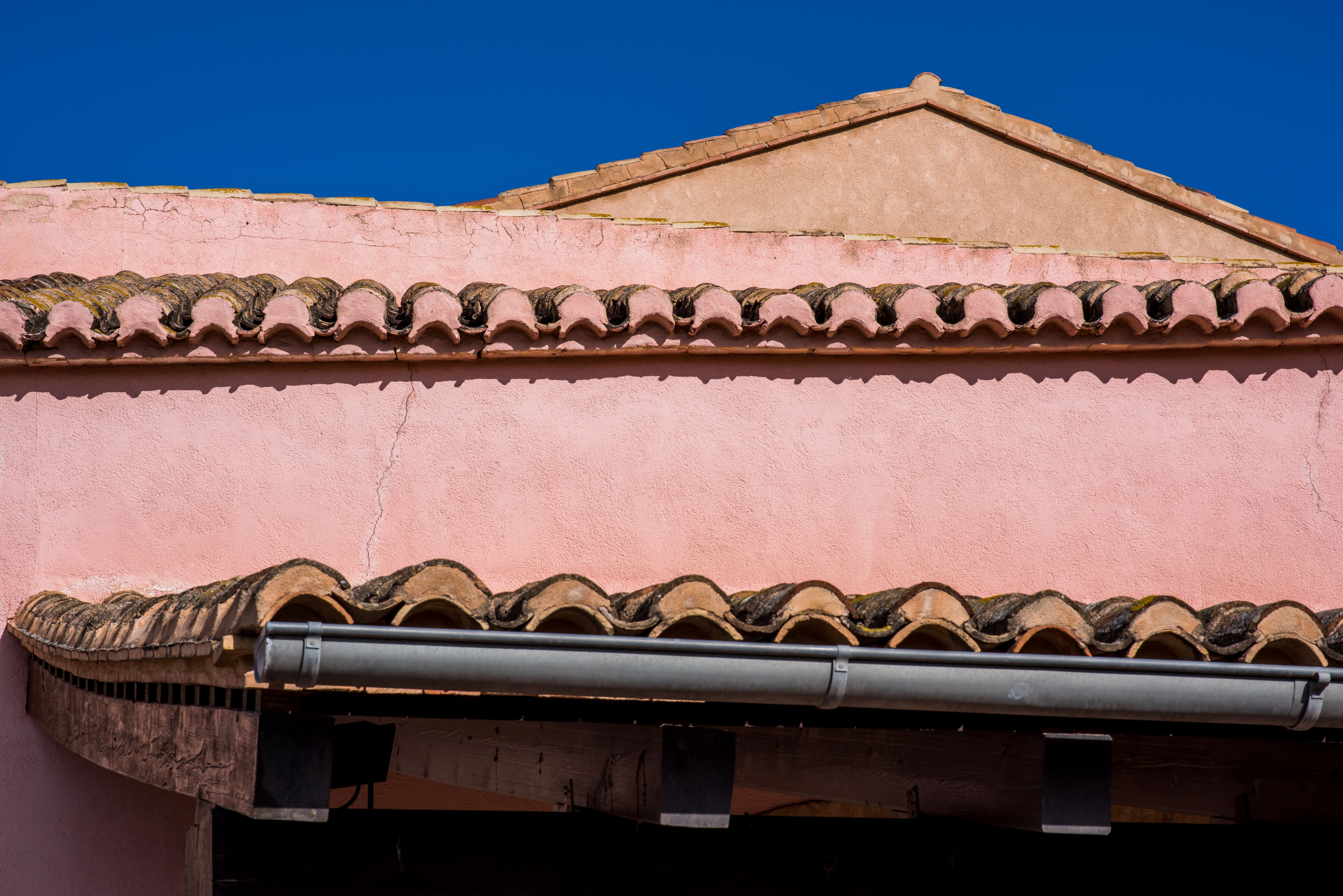 Rustic Pink Stucco Wall with Mediterranean Tiles · Free Stock Photo