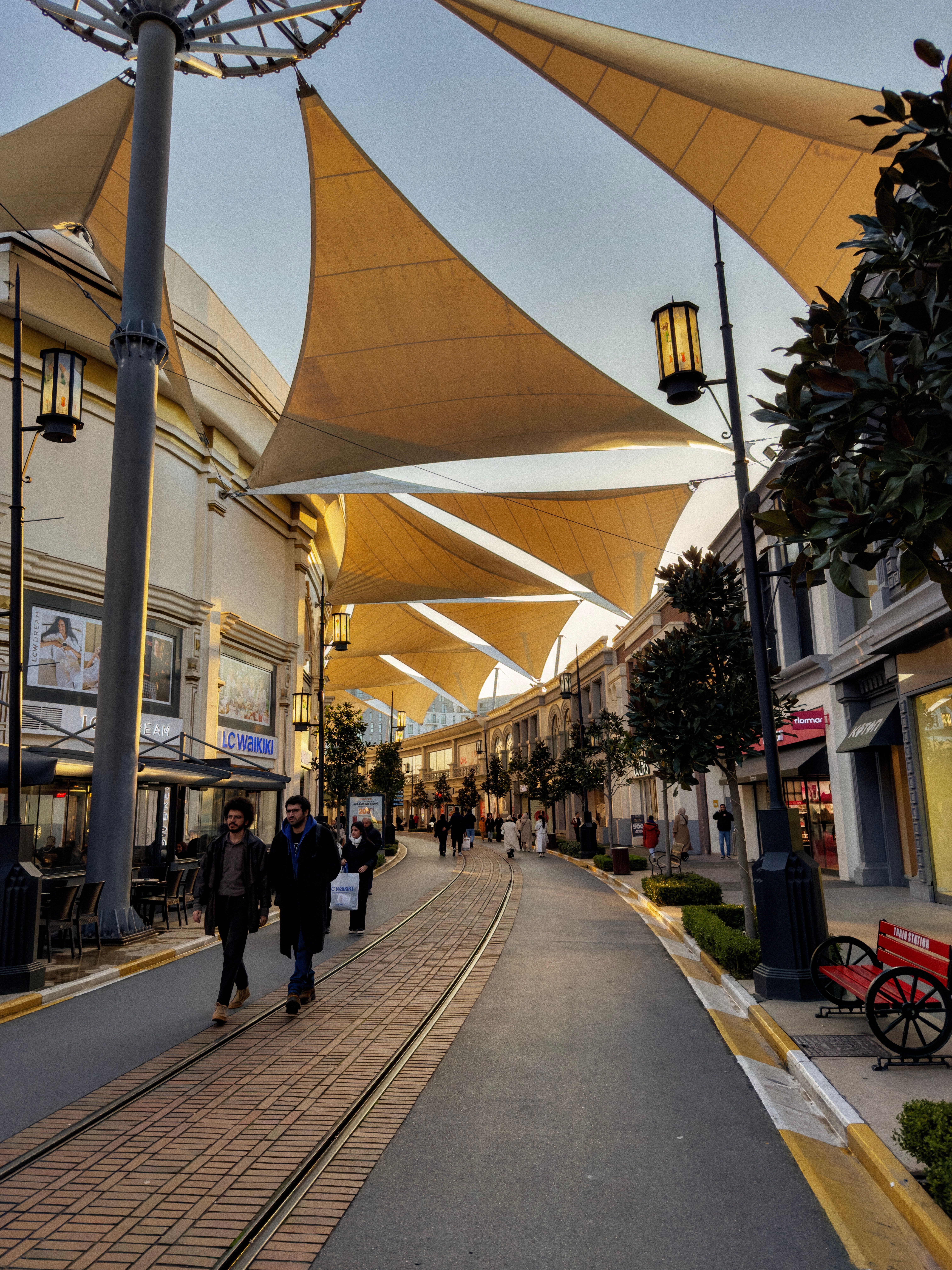 Modern Outdoor Shopping Street with Canopy · Free Stock Photo