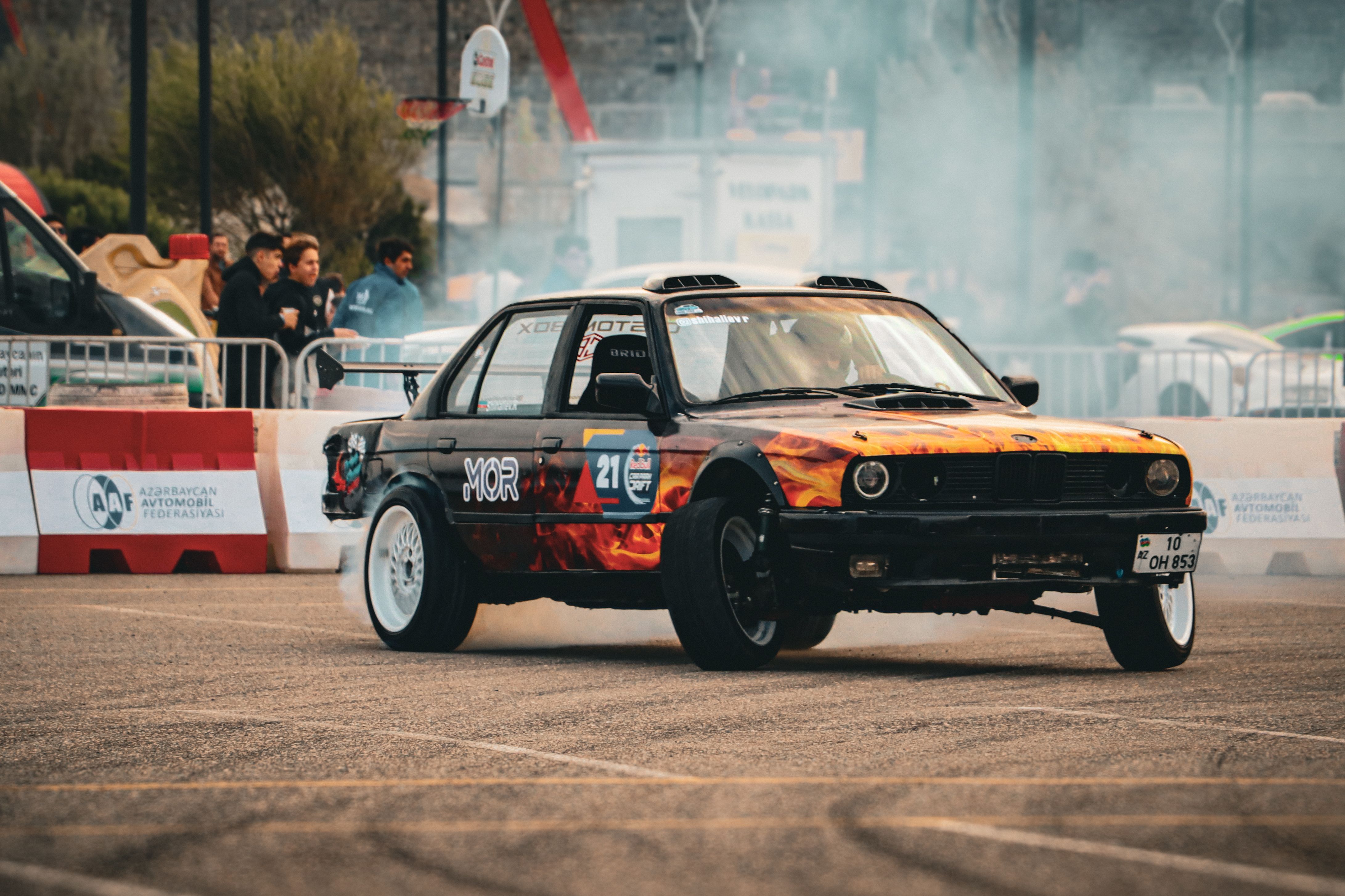 Car Drifting Action at Baku Motorsport Event · Free Stock Photo
