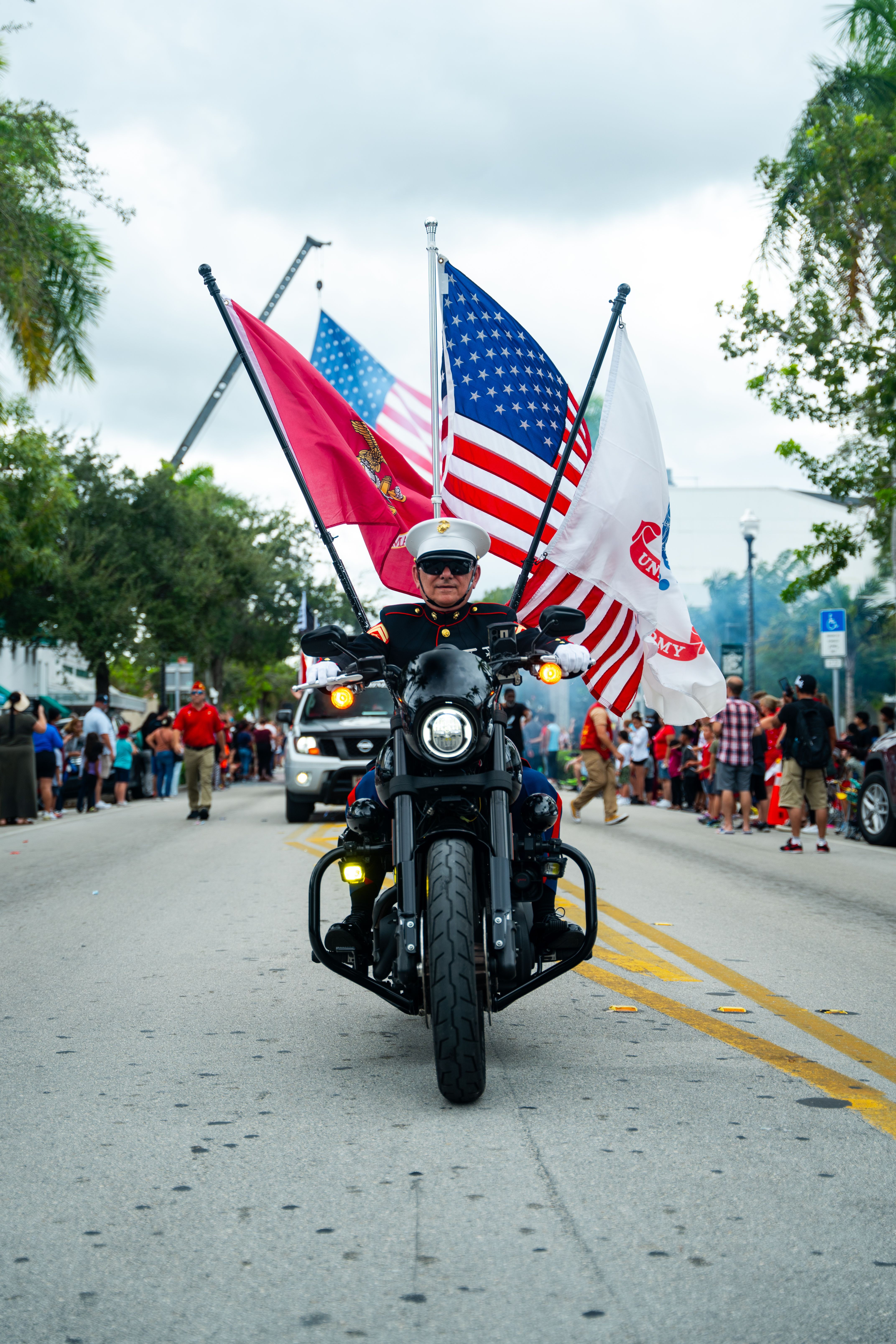 Veteran on Motorcycle Leading Flag Parade in Miami · Free Stock Photo