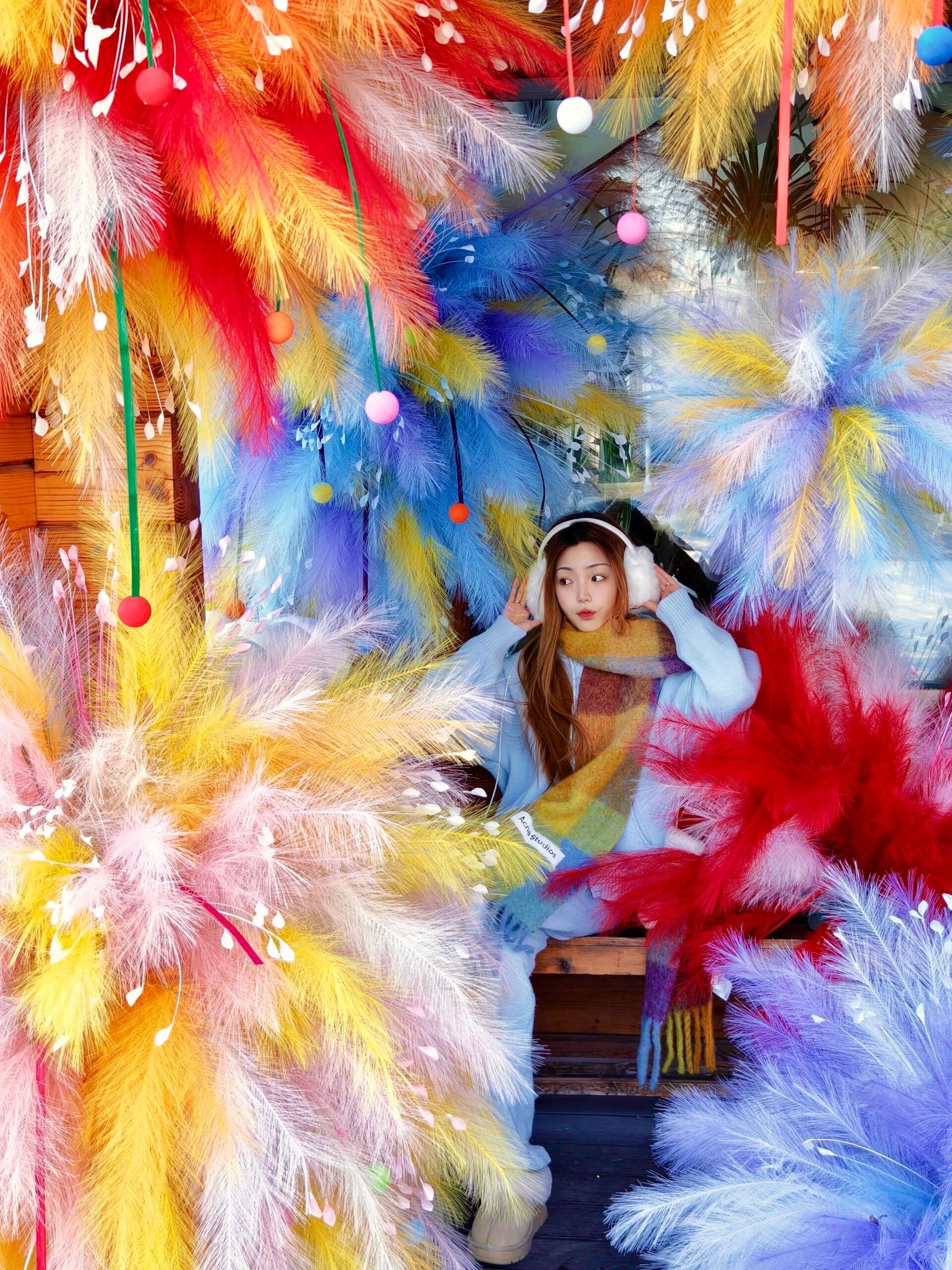Colorful Festival Scene with Vibrant Feathers · Free Stock Photo