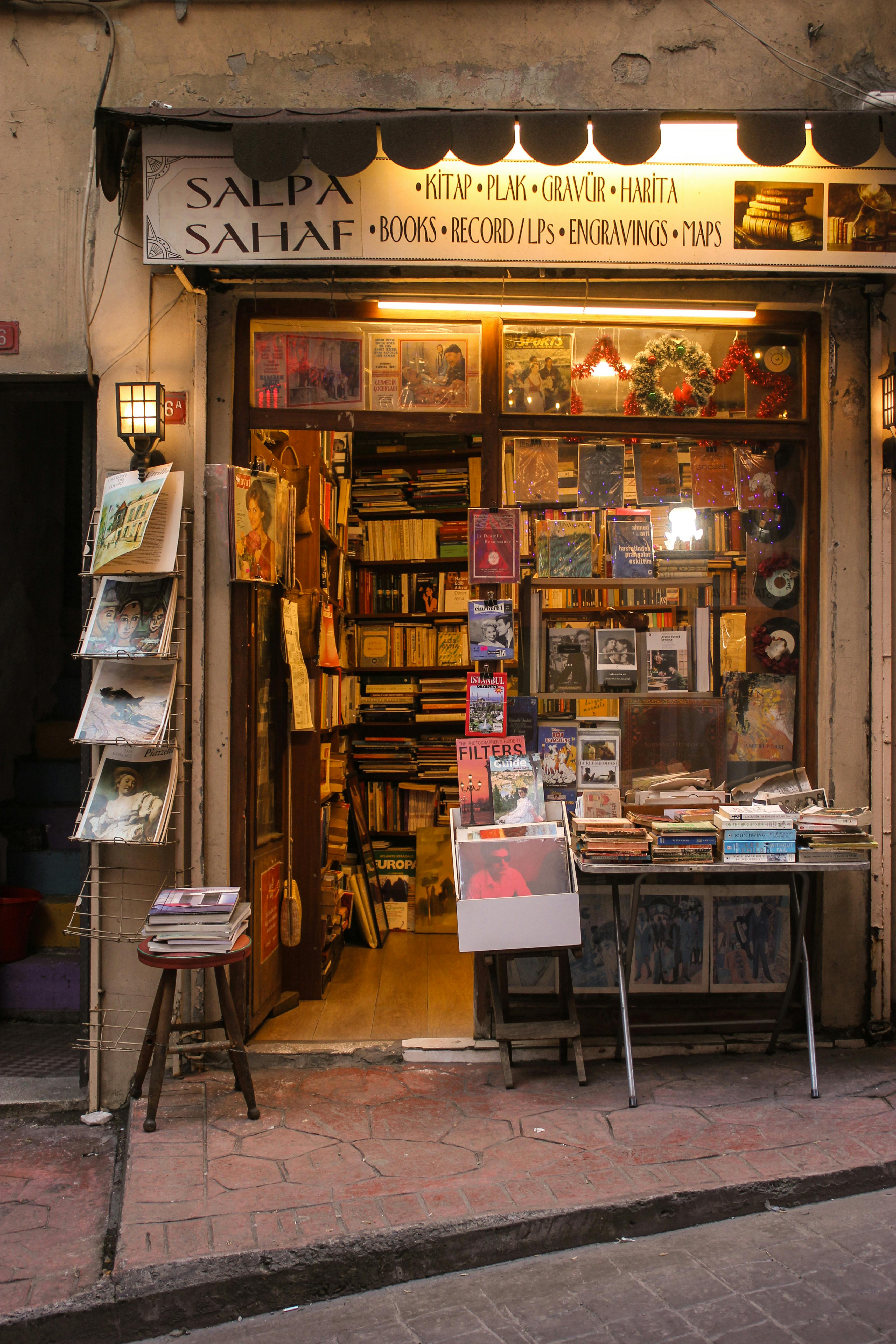 Vintage Bookstore Front on Narrow Street · Free Stock Photo