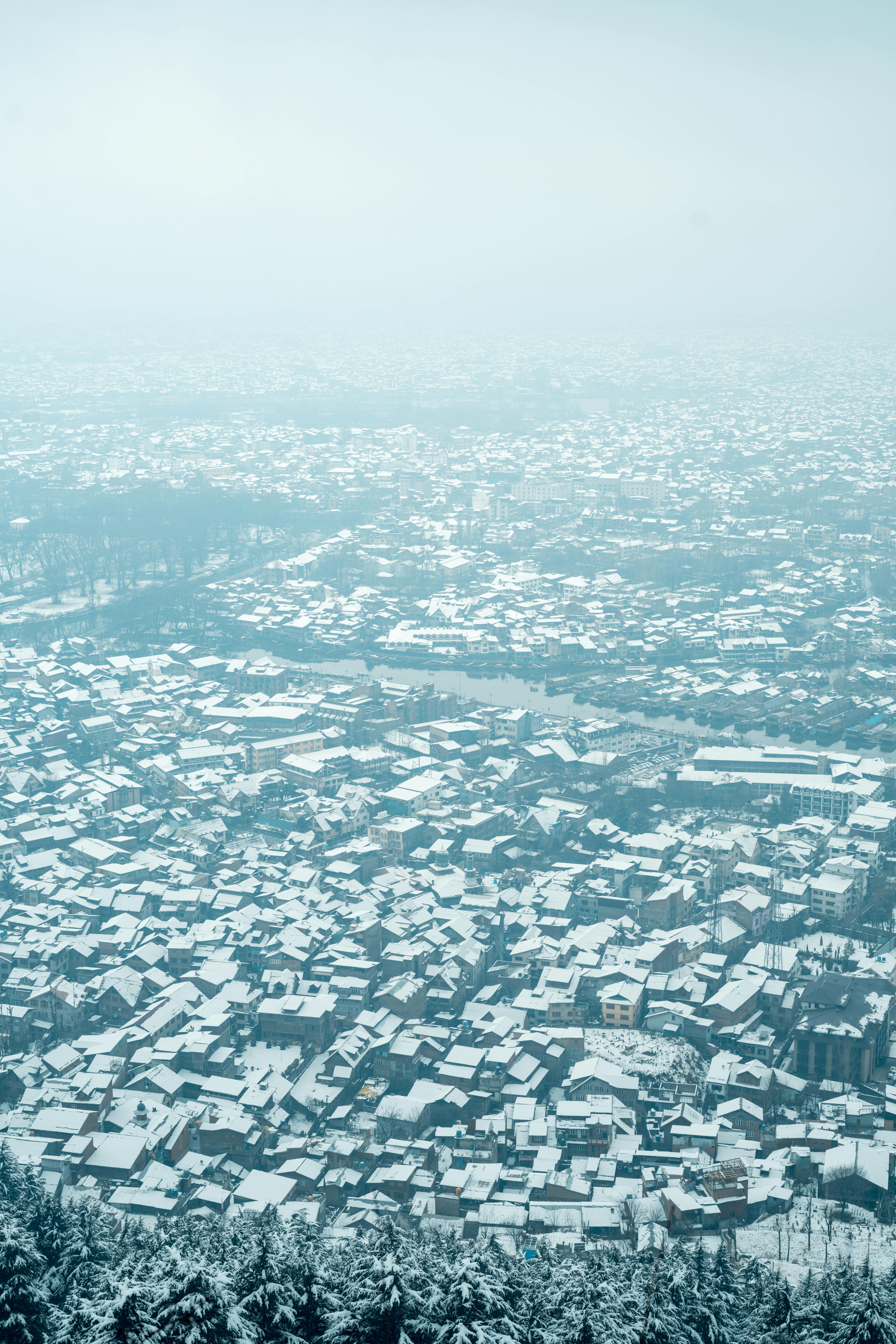Aerial View of Snow-Covered Srinagar in Winter · Free Stock Photo