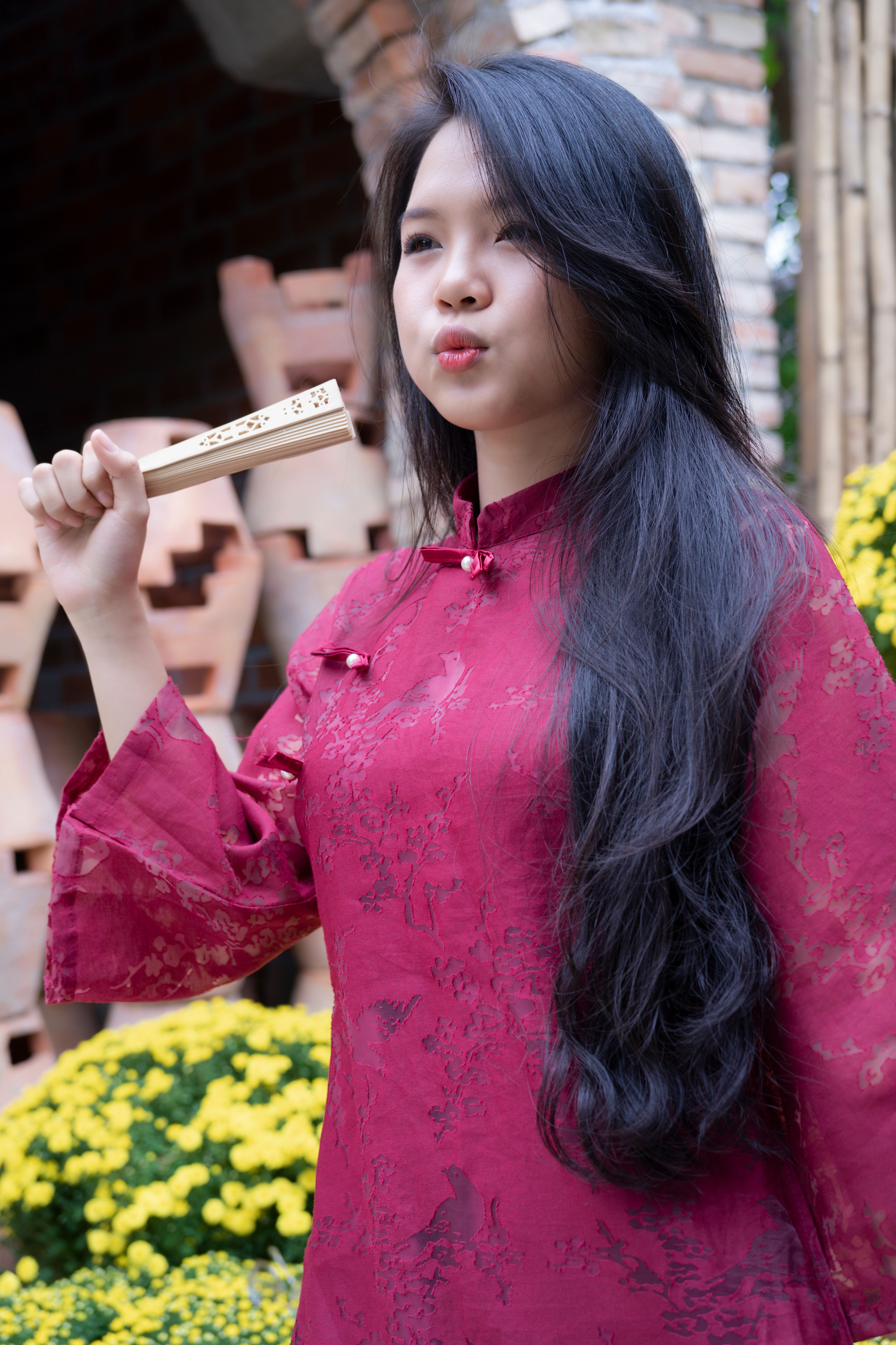 Young Woman in Traditional Red Dress Outdoors · Free Stock Photo