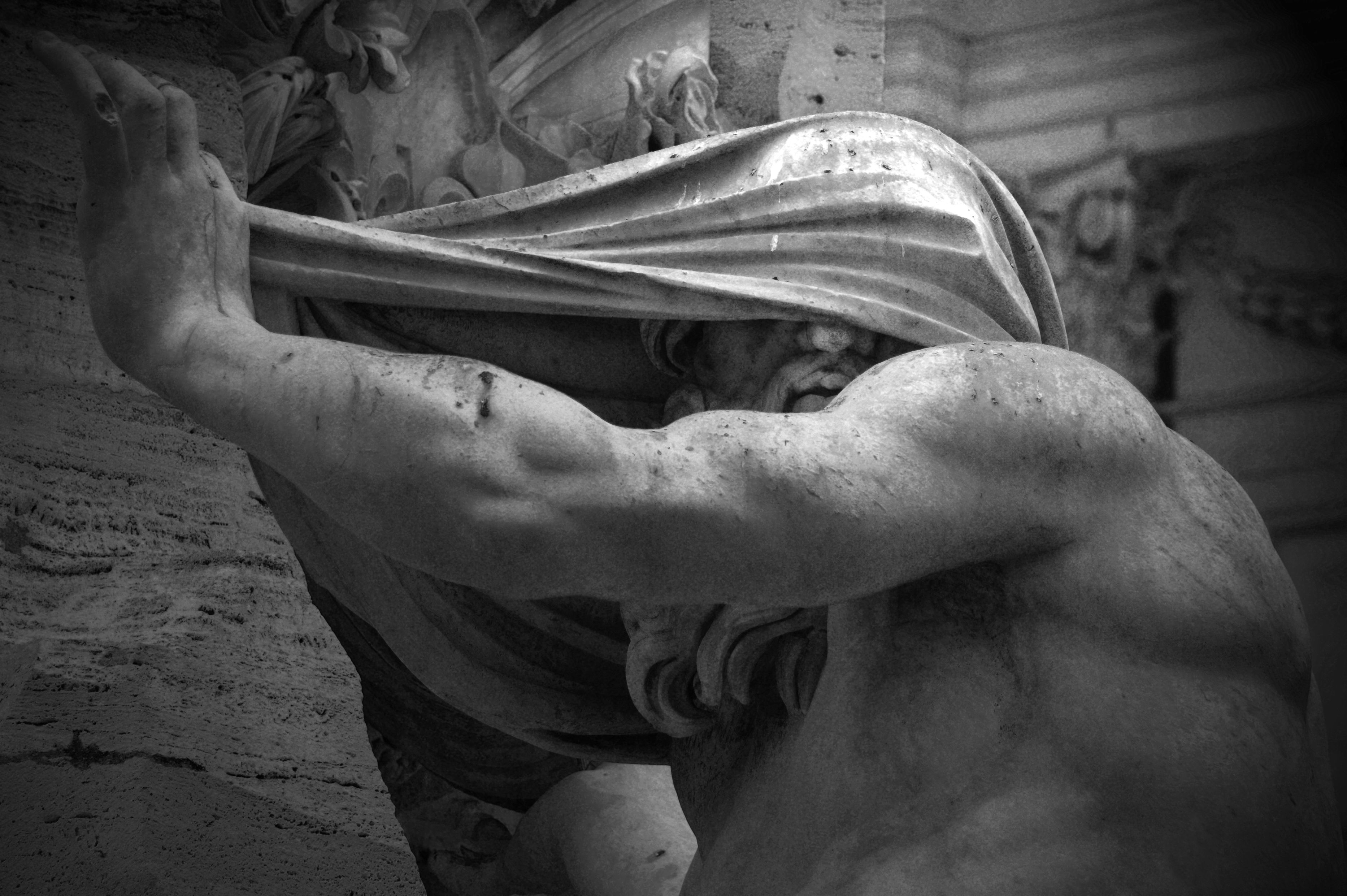 Dramatic Black and White Classical Statue Detail · Free Stock Photo