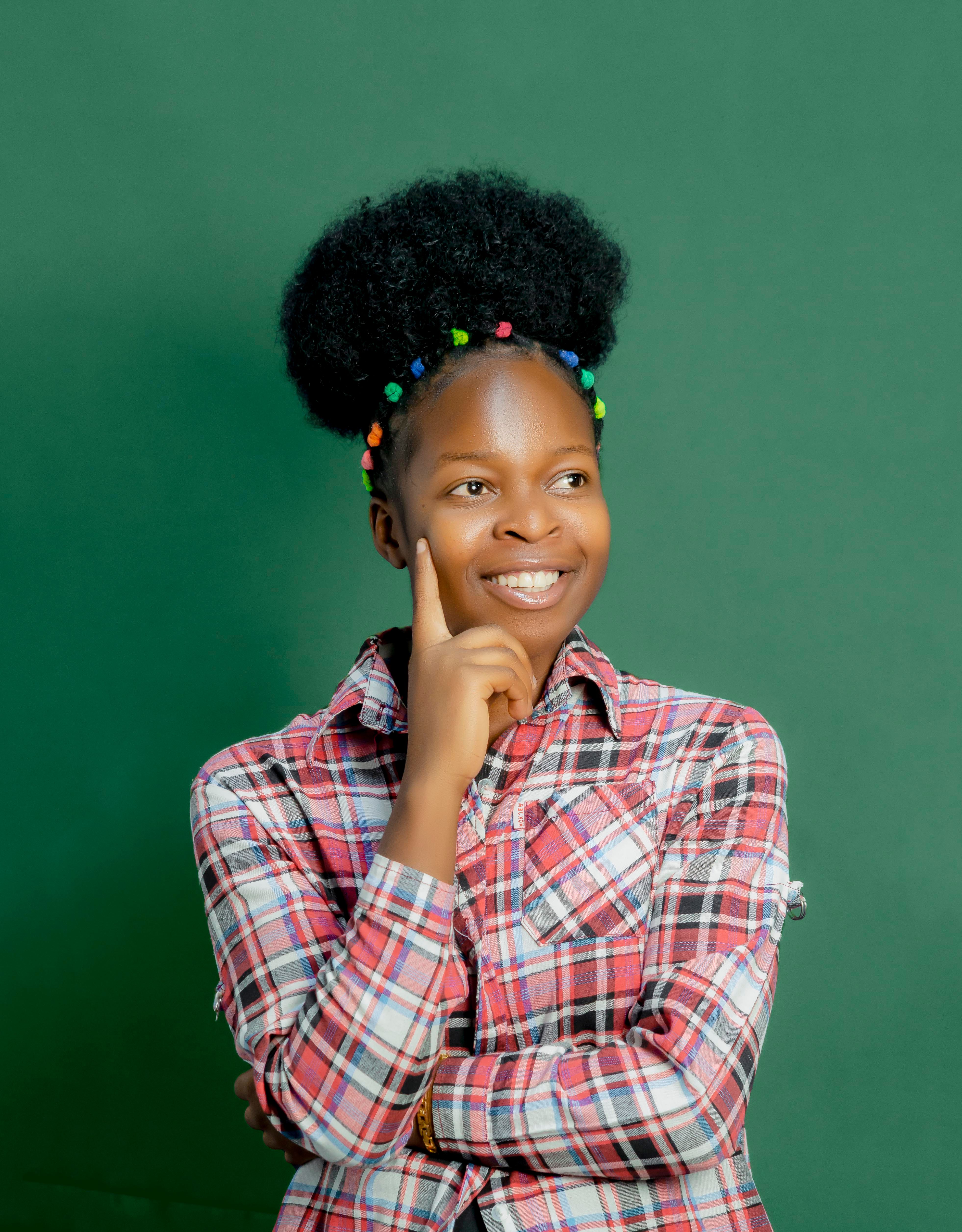 Happy African Girl with Colorful Hair Beads · Free Stock Photo