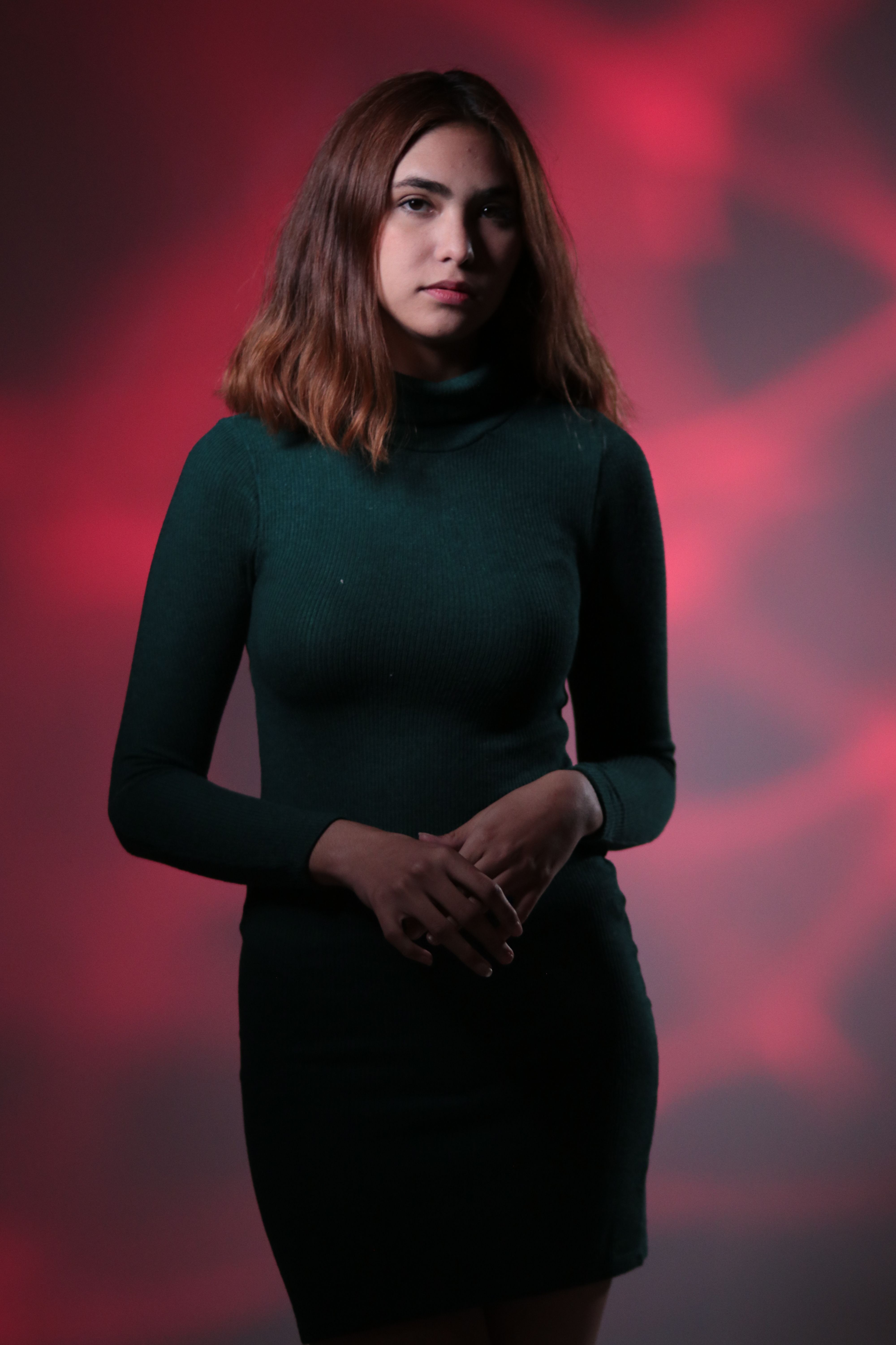 Portrait of Woman in Dark Dress with Red Lighting · Free Stock Photo