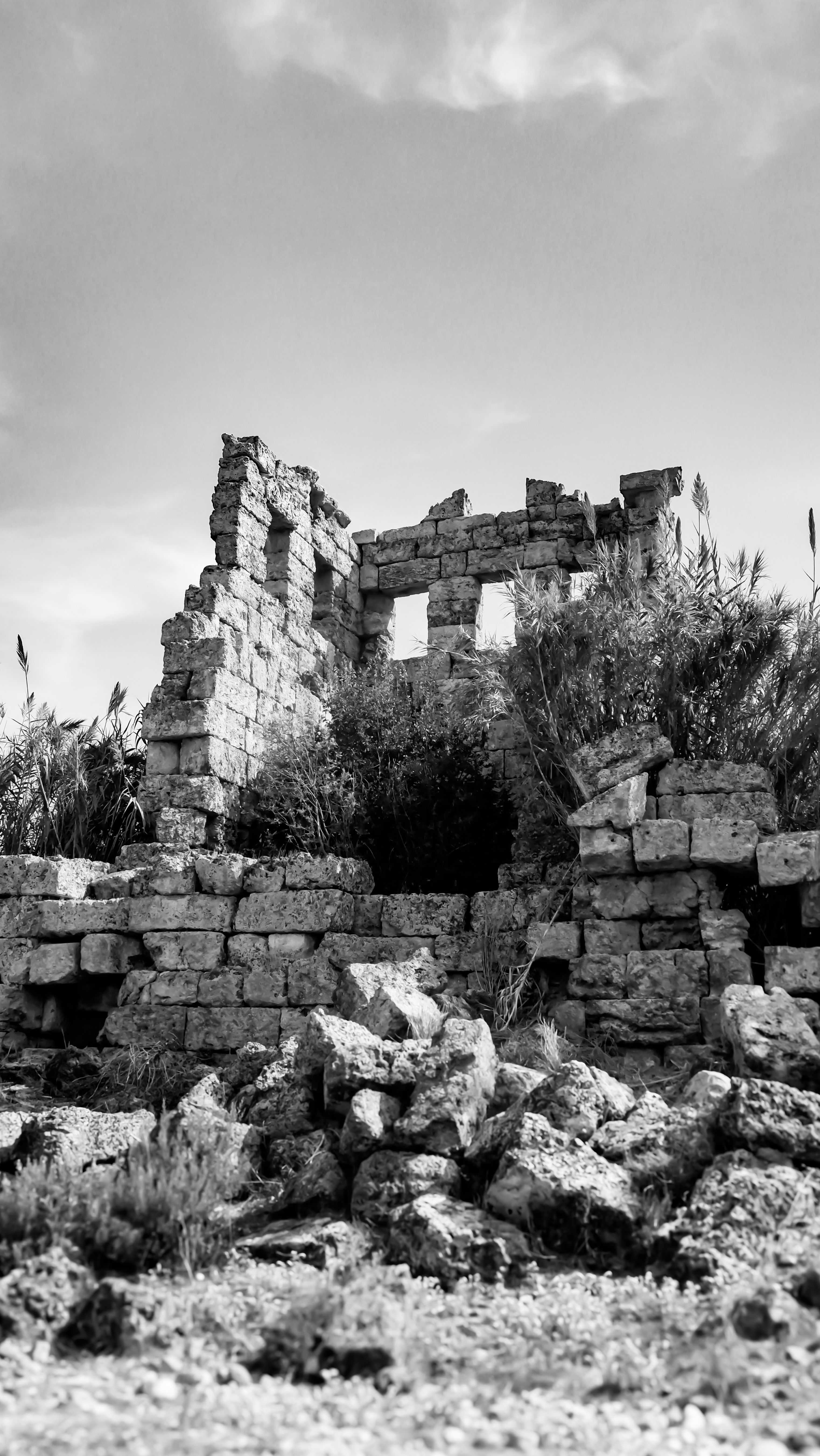 Ancient Ruins with Dramatic Sky in Monochrome · Free Stock Photo