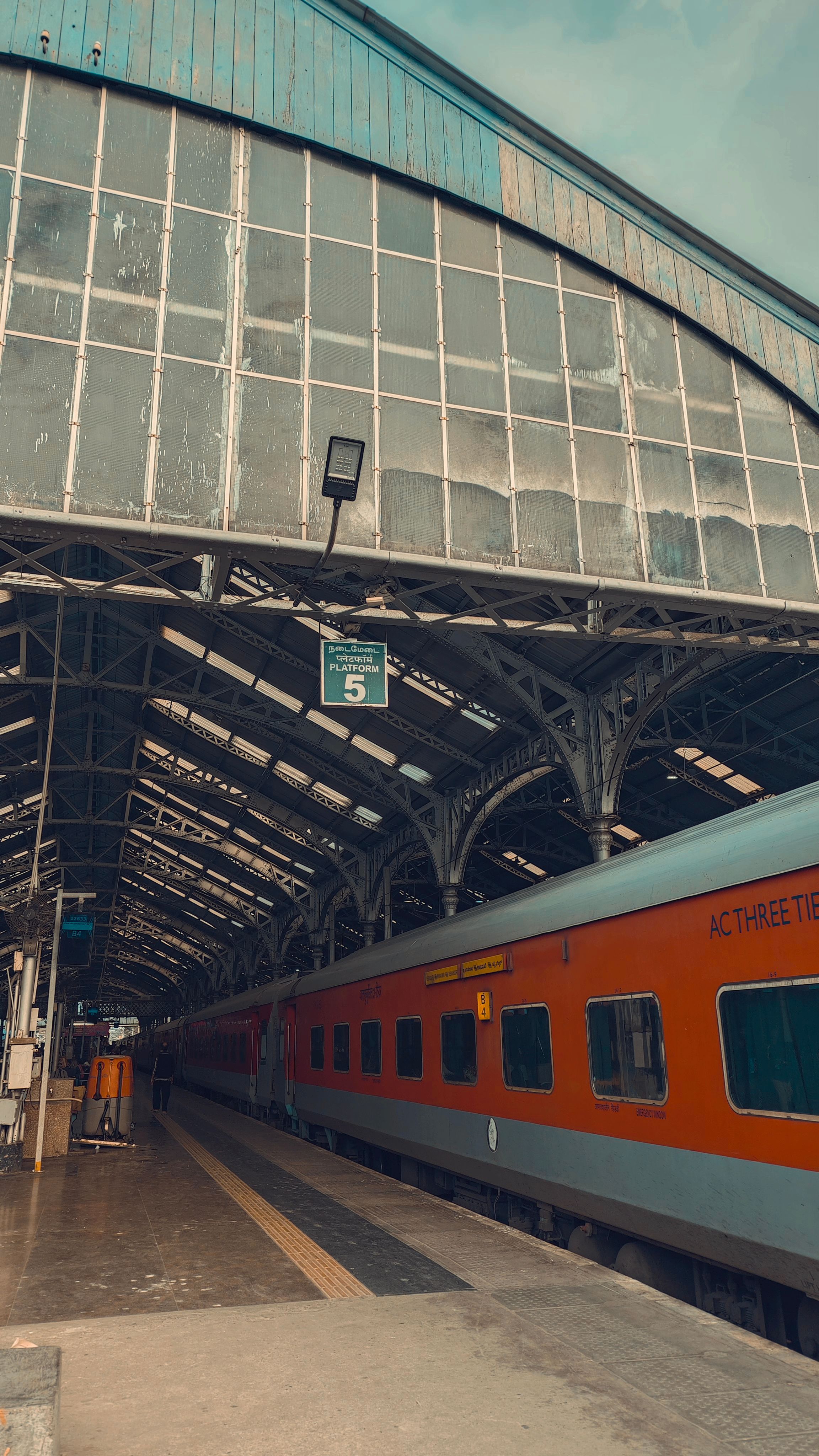 Chennai Railway Station with Iconic Orange Train · Free Stock Photo