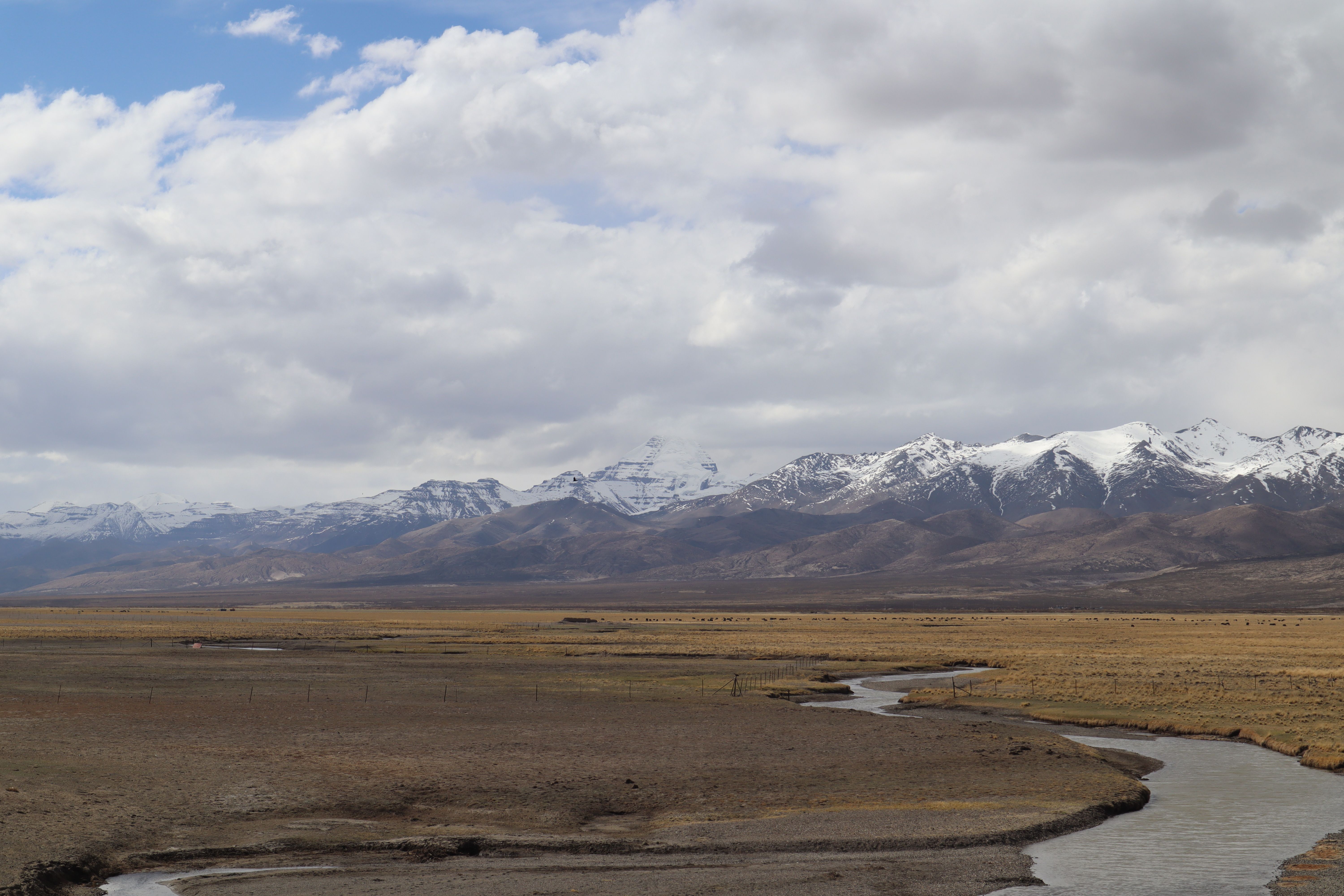 Snow-Capped Mountains with Winding River in Remote Landscape · Free ...