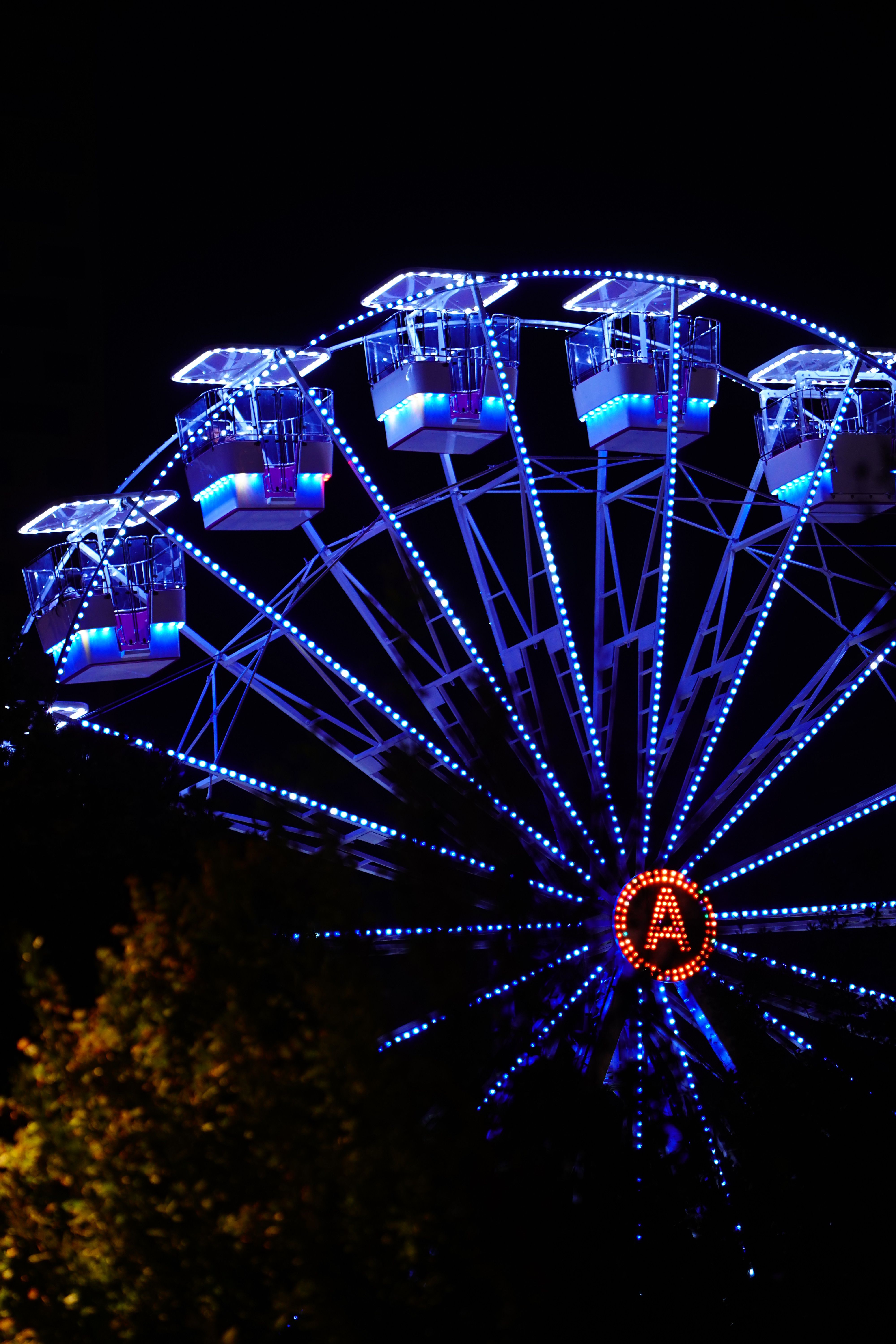 Vibrant Ferris Wheel Illuminated at Night · Free Stock Photo