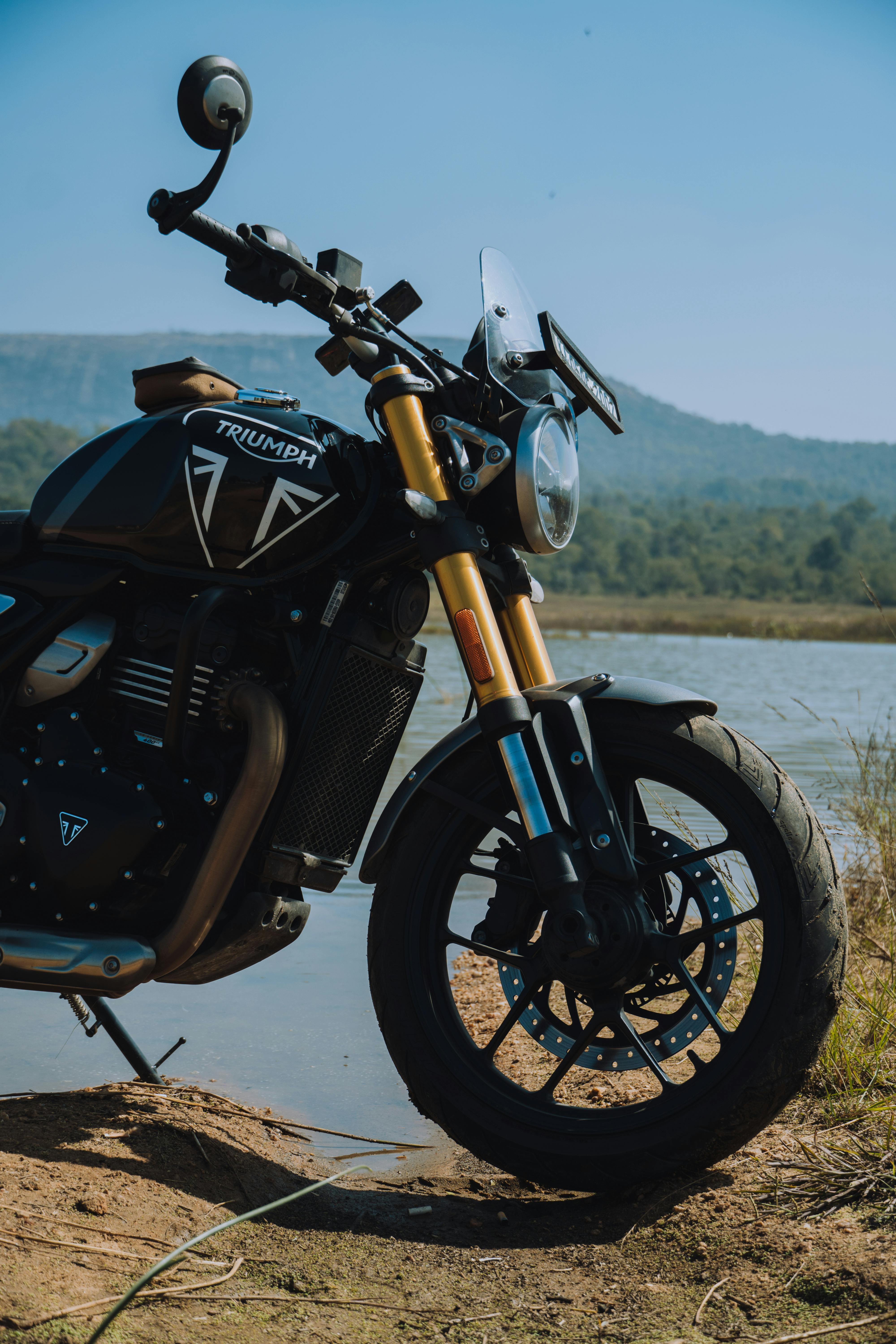 Motorcycle by Lakeside in Bengaluru Scenery · Free Stock Photo