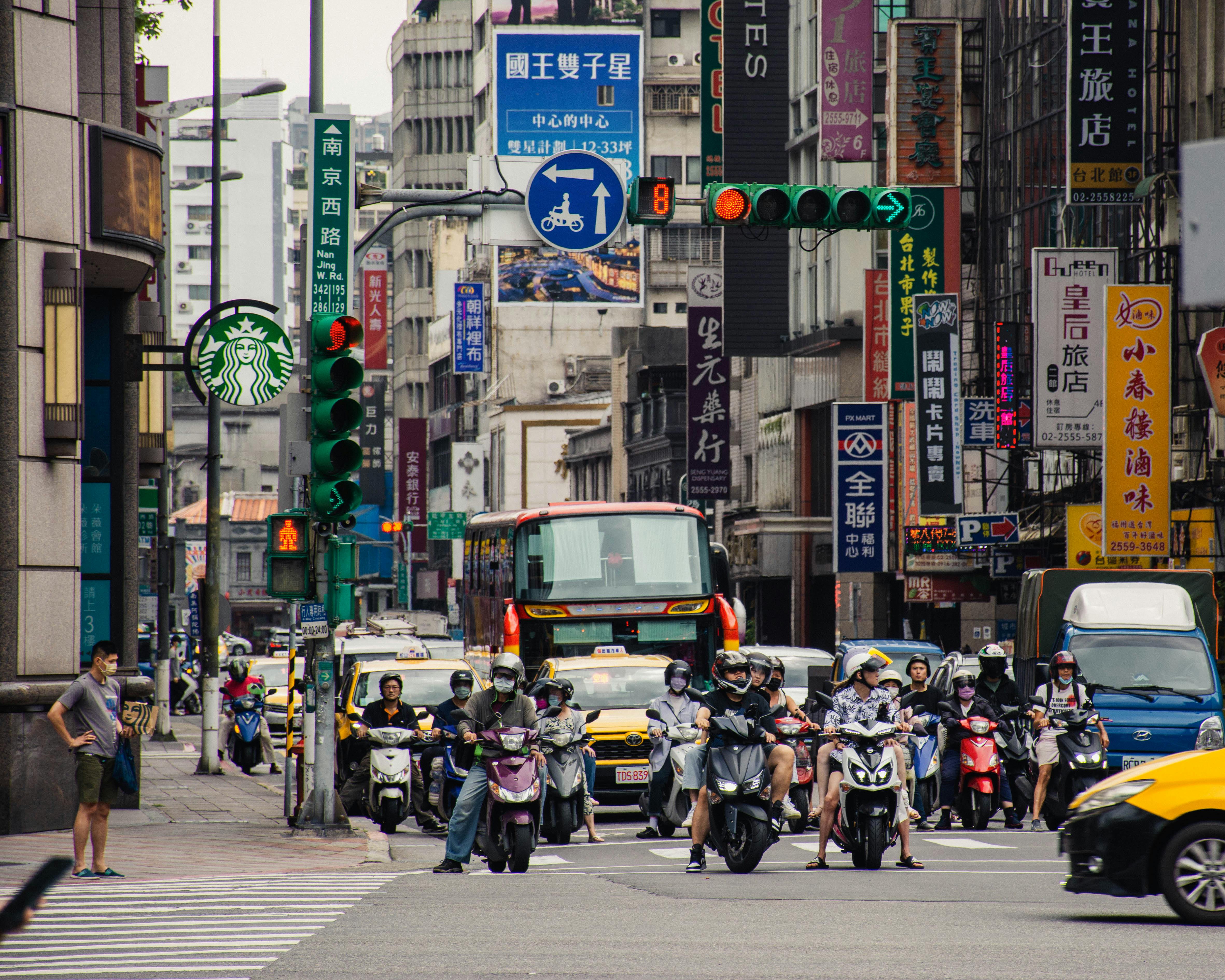 Busy Taipei City Intersection with Traffic · Free Stock Photo