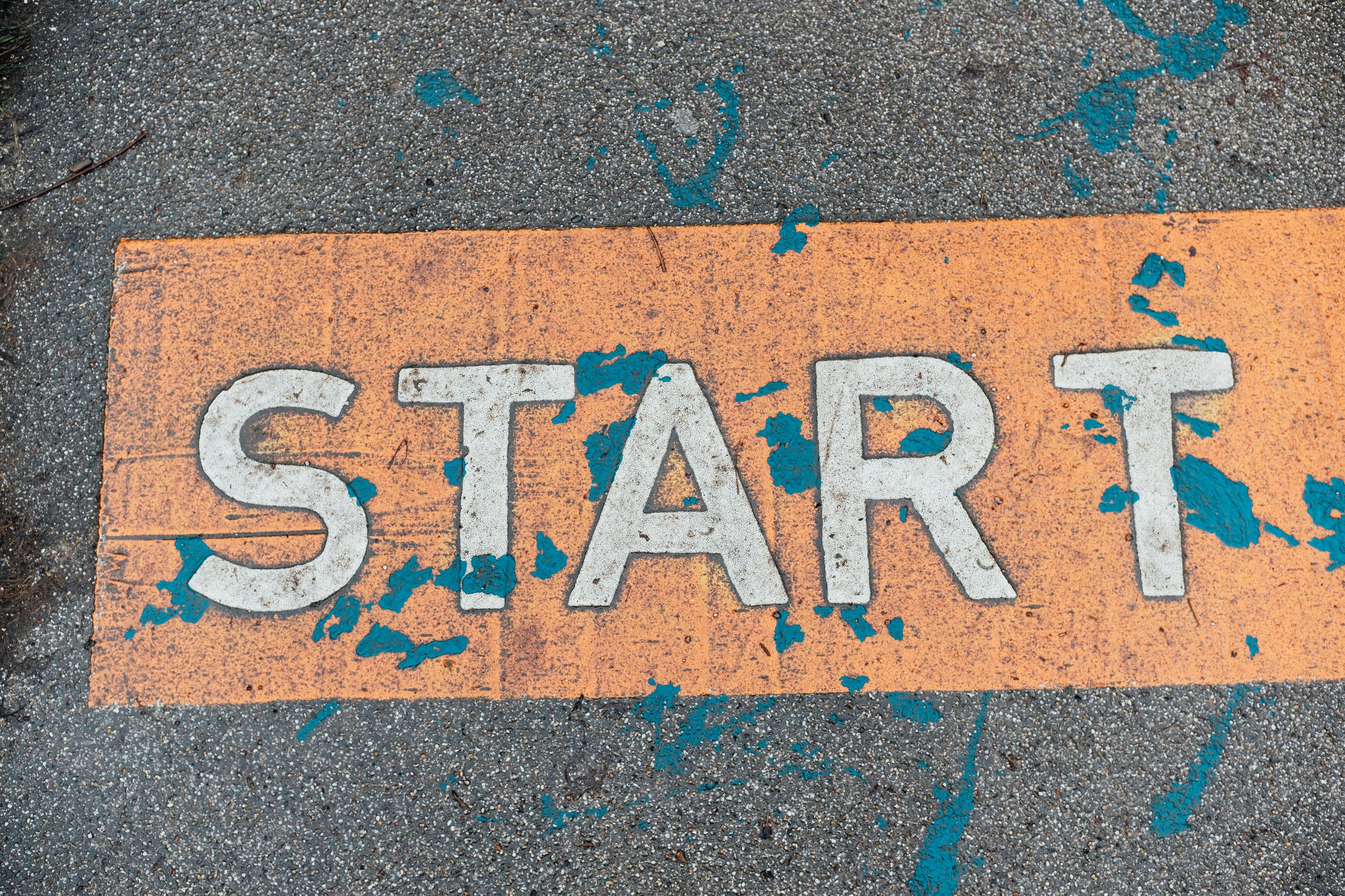 Worn Start Line on Urban Pavement · Free Stock Photo