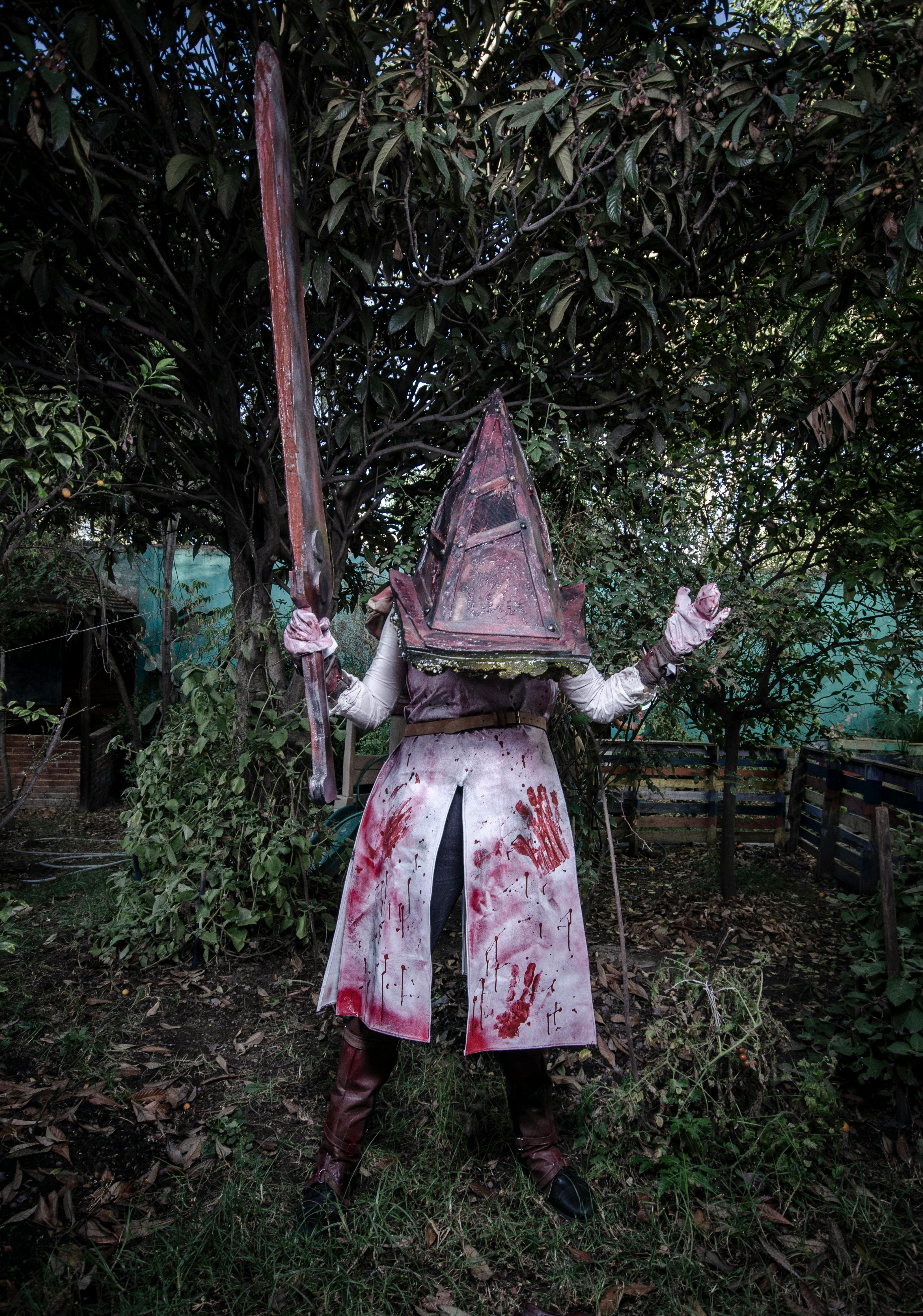 Pyramid Head Cosplay in Forest Setting · Free Stock Photo