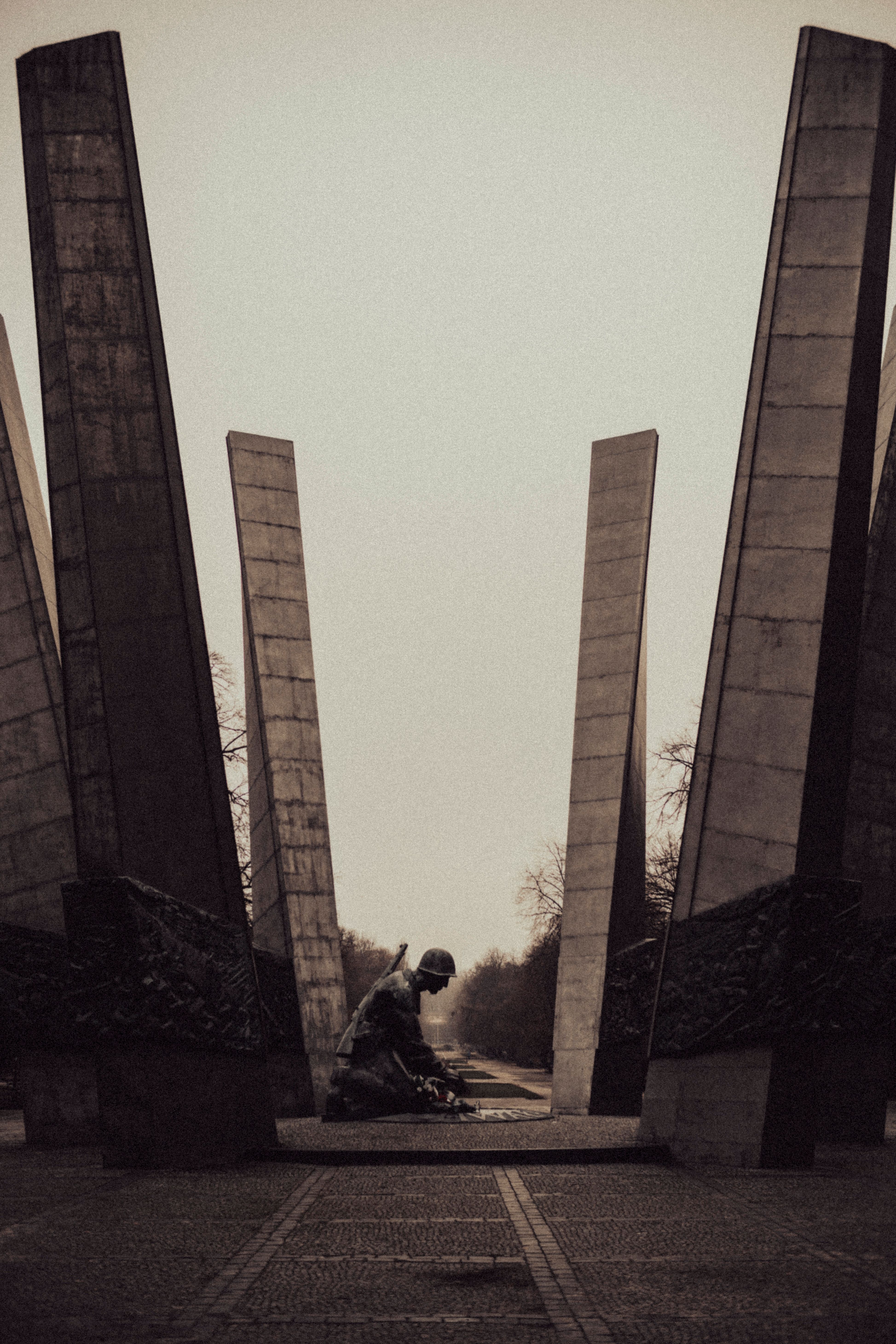 Dramatic Monument with Soldier Sculpture in Moody Setting · Free Stock ...