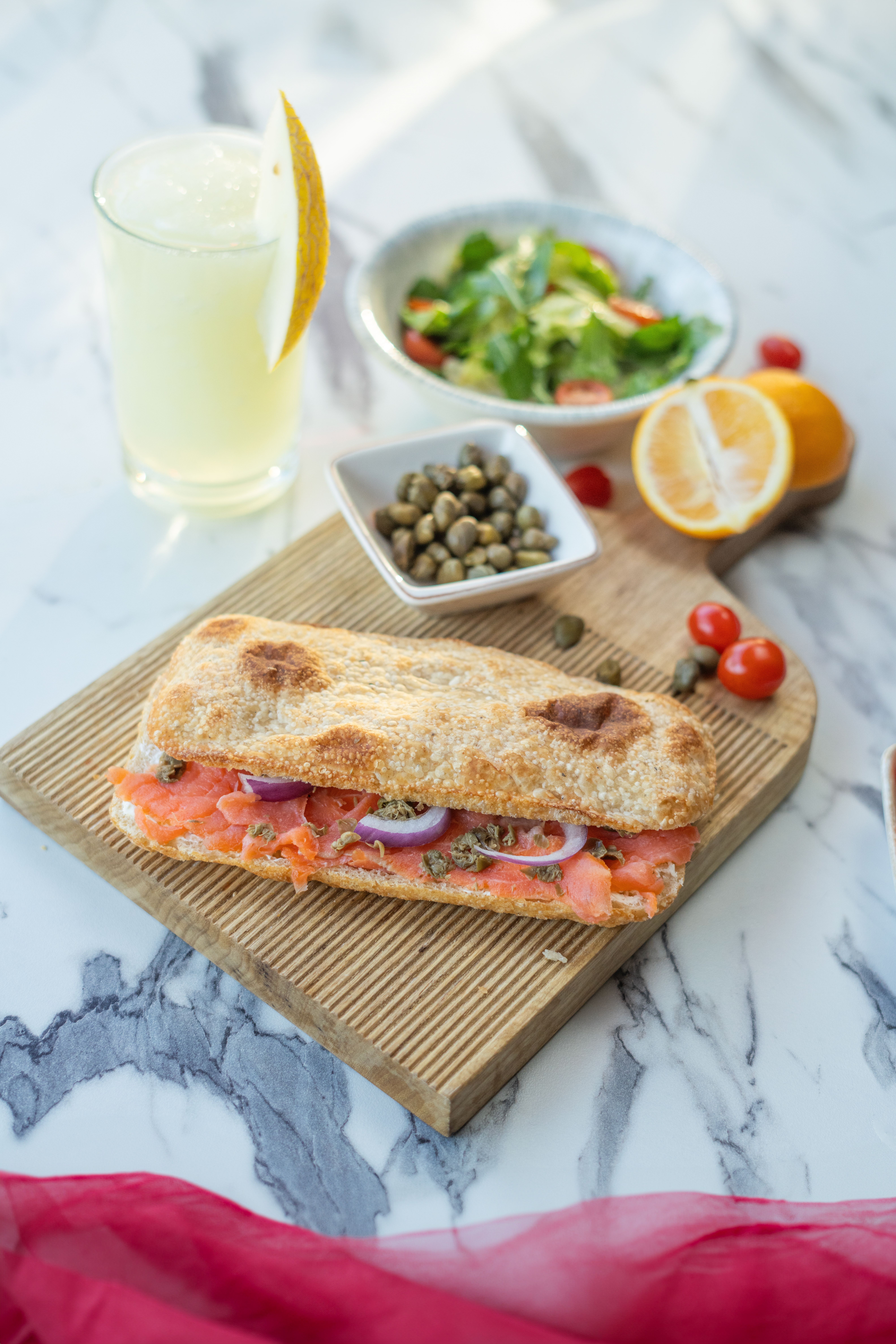 Delicious Fresh Salmon Sandwich on Marble Table · Free Stock Photo