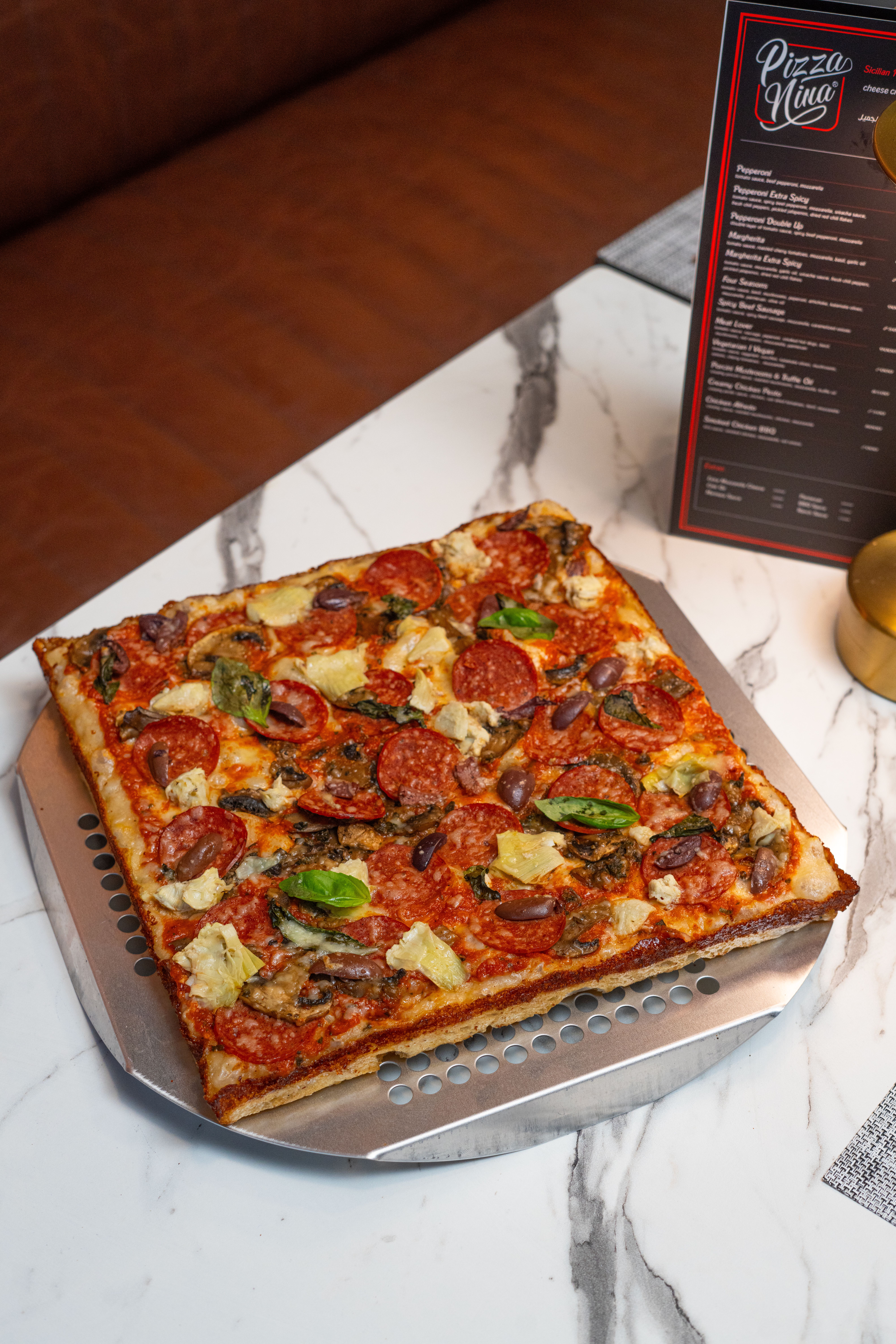 Delicious Square Pizza with Toppings in Baghdadi Restaurant · Free ...