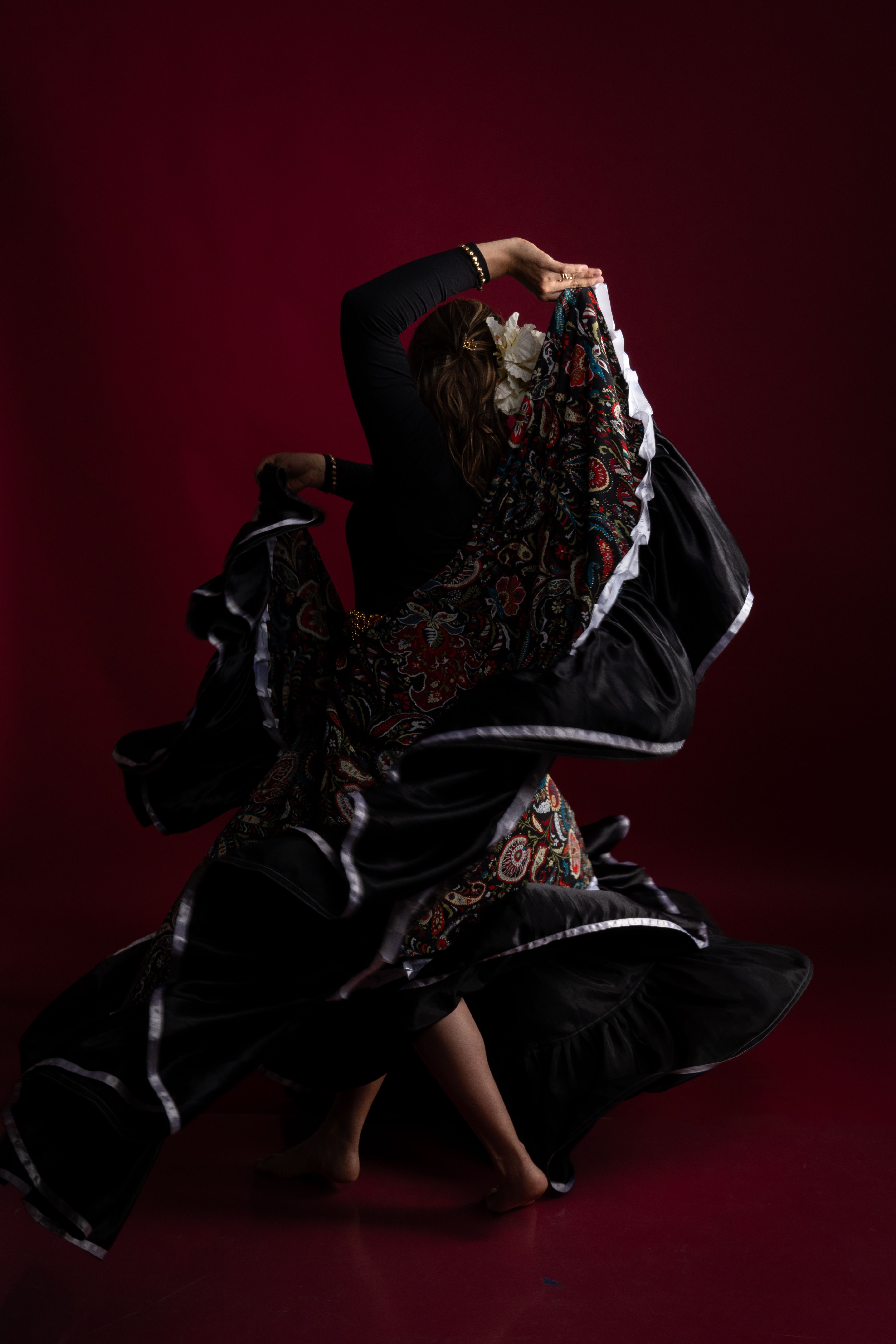 Captivating Dance in Flowing Black Dress · Free Stock Photo