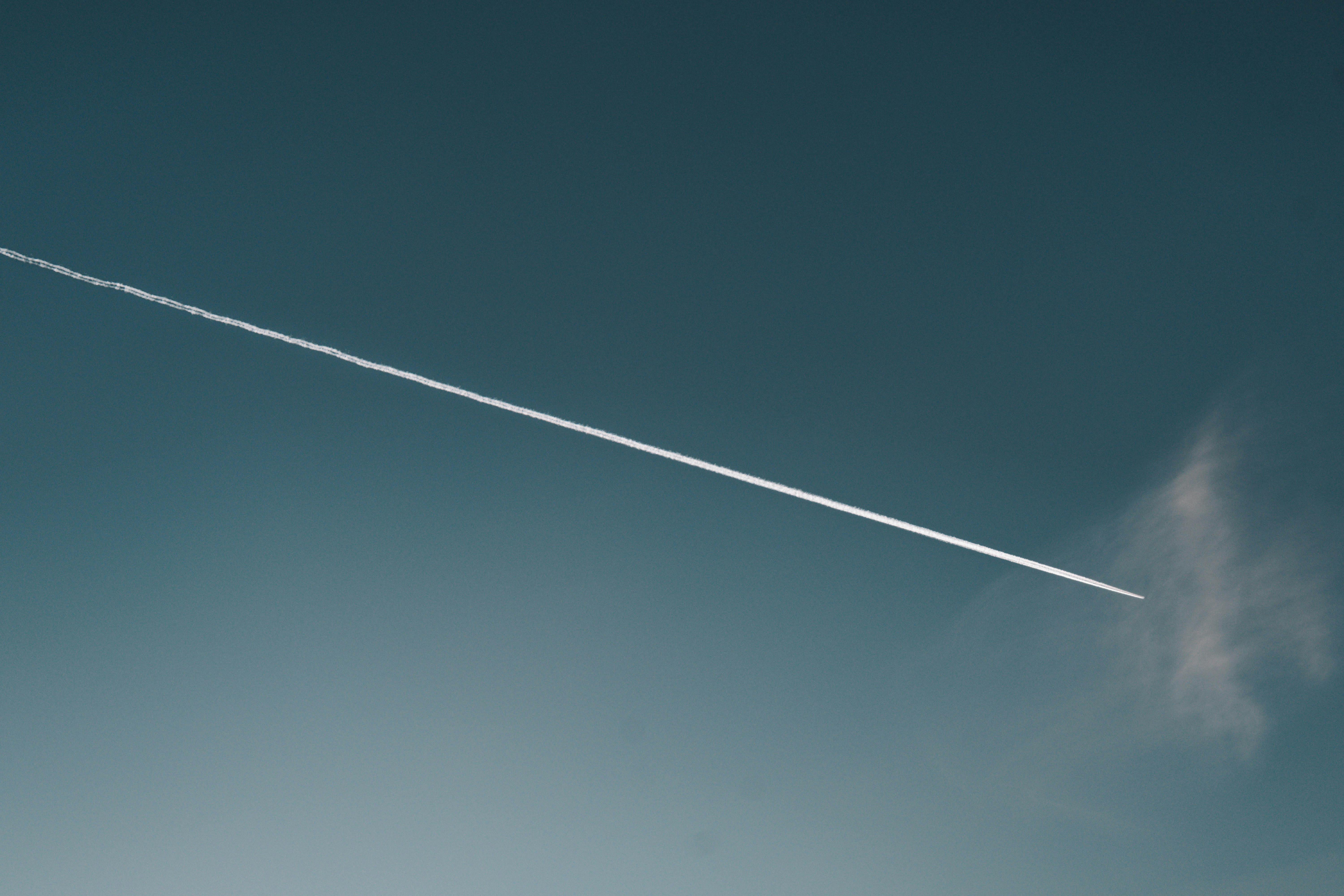 Aerial View of Contrail Against Clear Sky · Free Stock Photo