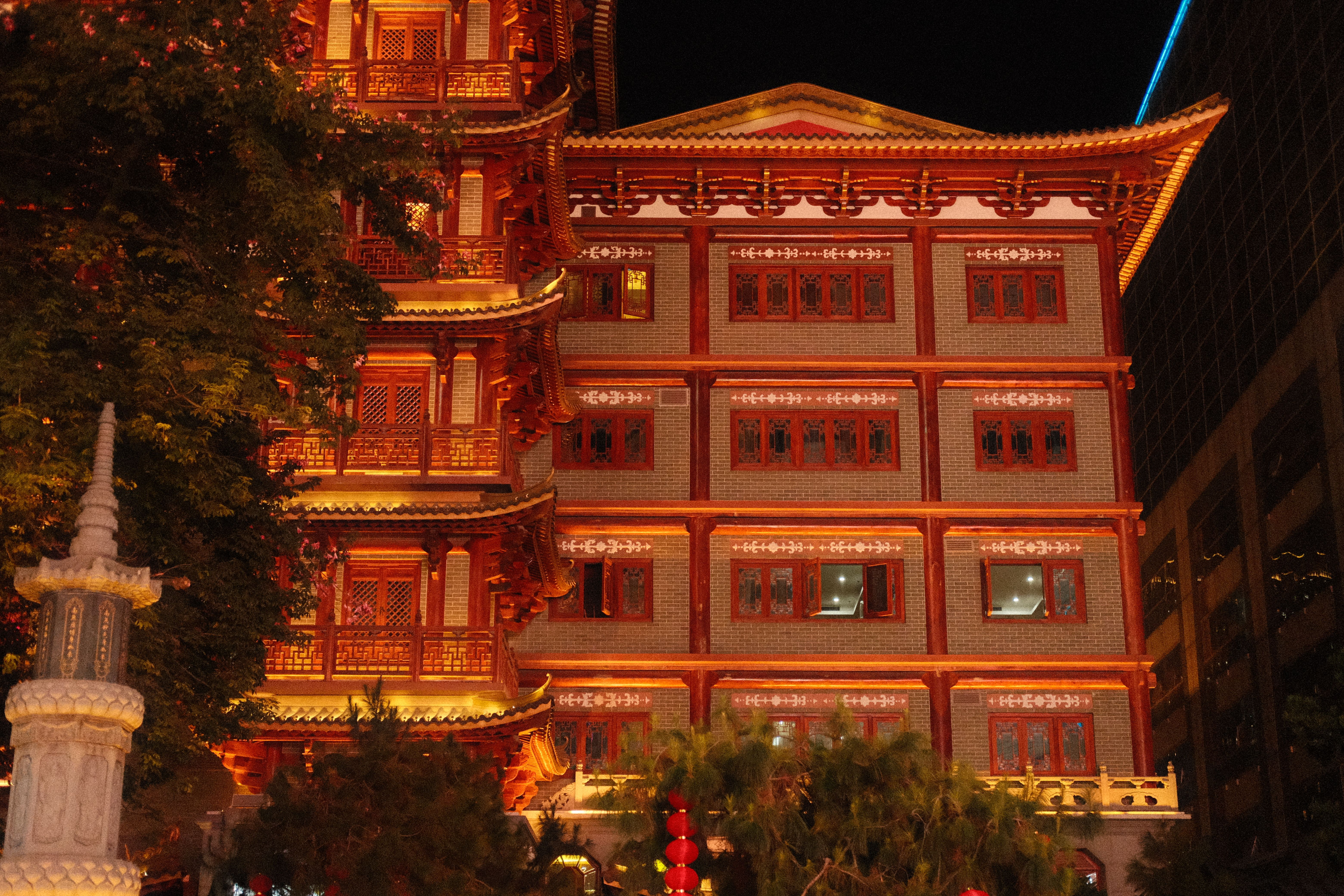 Illuminated Traditional Building at Night · Free Stock Photo